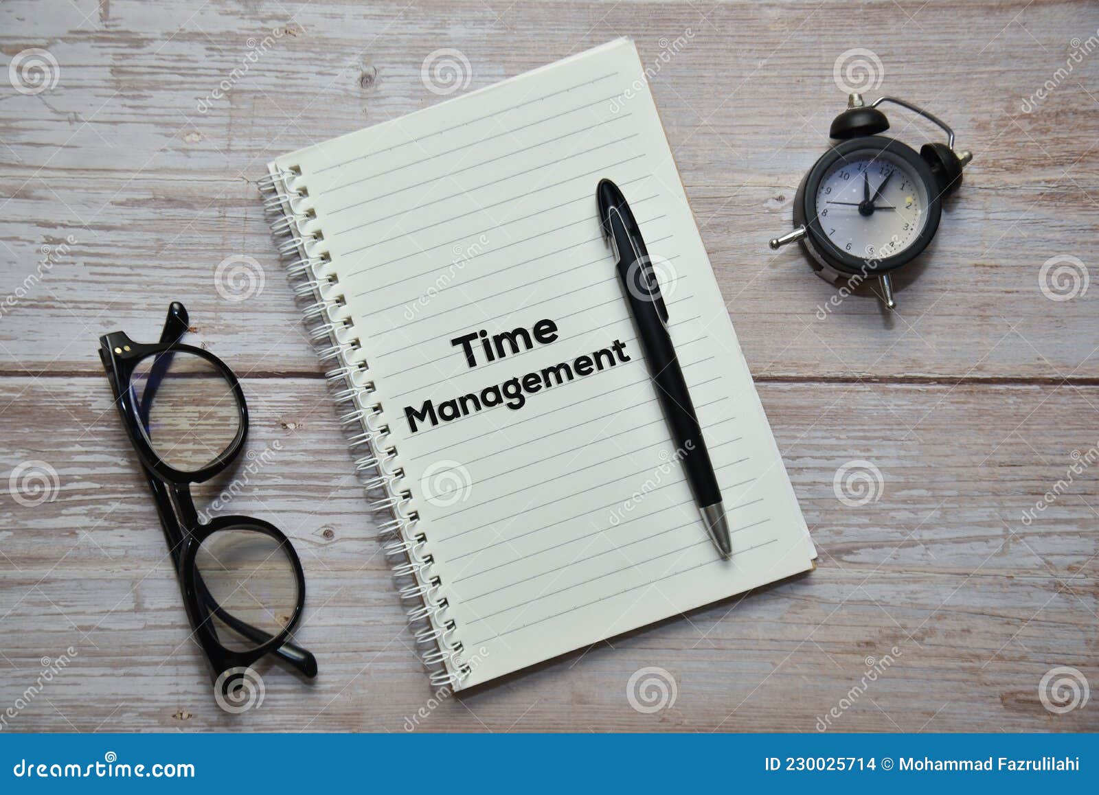 TIME MANAGEMENT Text on Notebook with Pen, Spectacles and Analog Alarm ...