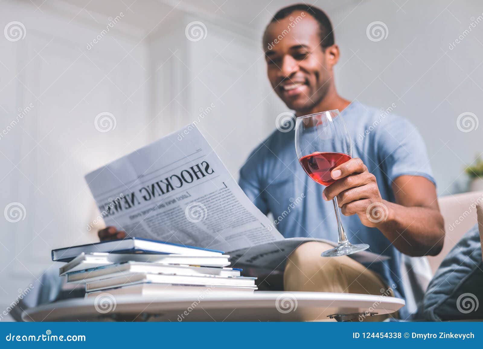 Cheerful Man Reading Articles Stock Photo - Image of alcohol, title ...