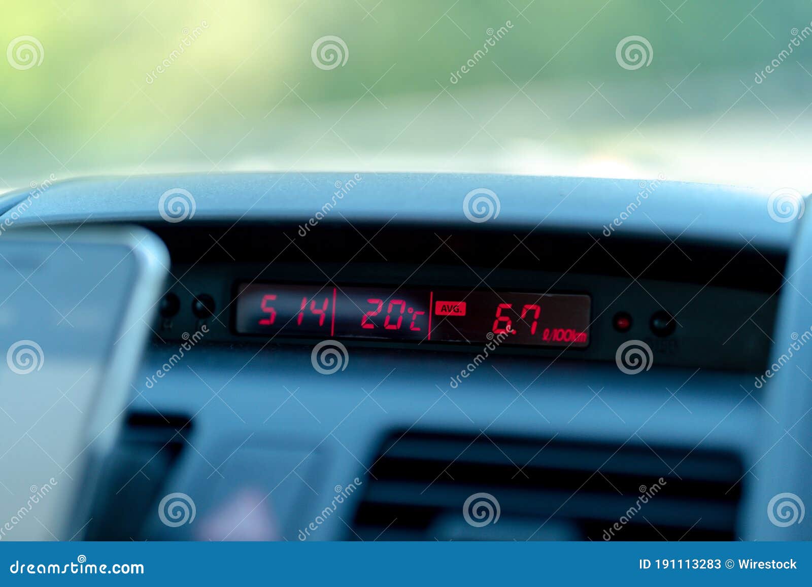 Time and Temperature and Speed Written on the Dashboard of a Car Stock ...