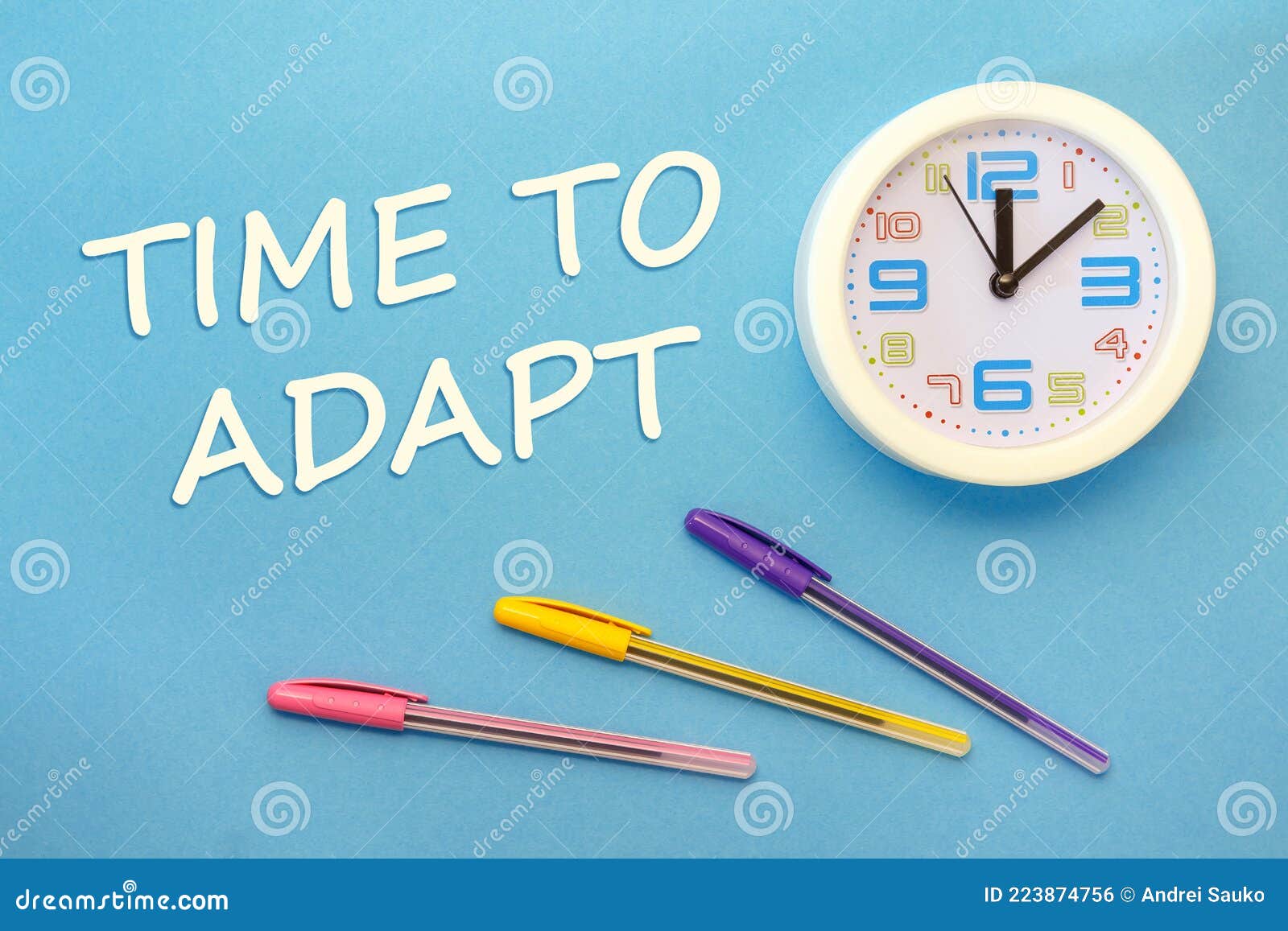 Time To Adapt - Lettering on a Blue Background and Clock Stock Photo ...