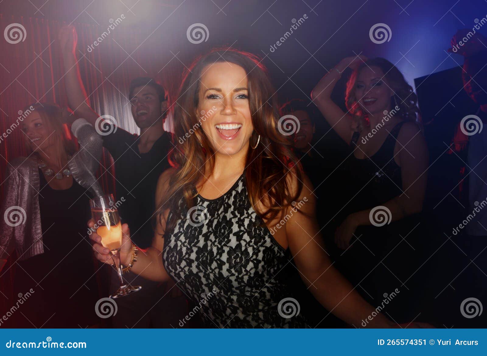Time To Celebrate A Lovely Young Woman Smiling At The Camera While