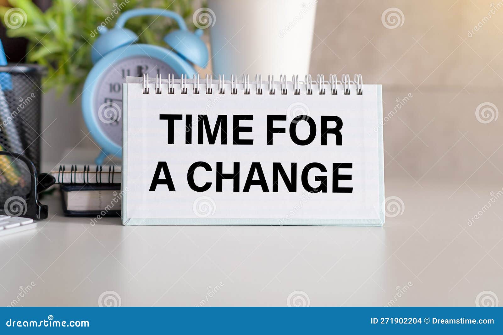 TIME TO CHANGE Word Written on Notepad. TIME TO CHANGE Text on Table ...