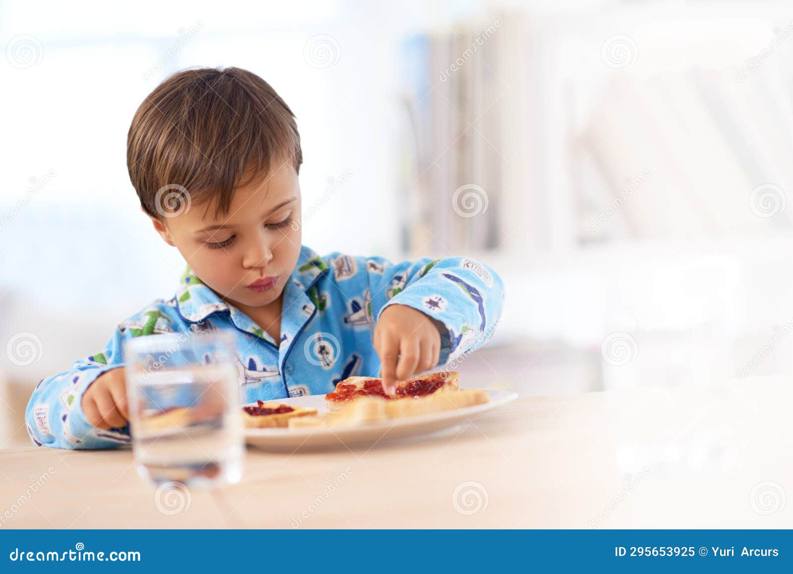 Time To Get My Breakfast on. a Cute Little Boy Eating Breakfast. Stock ...