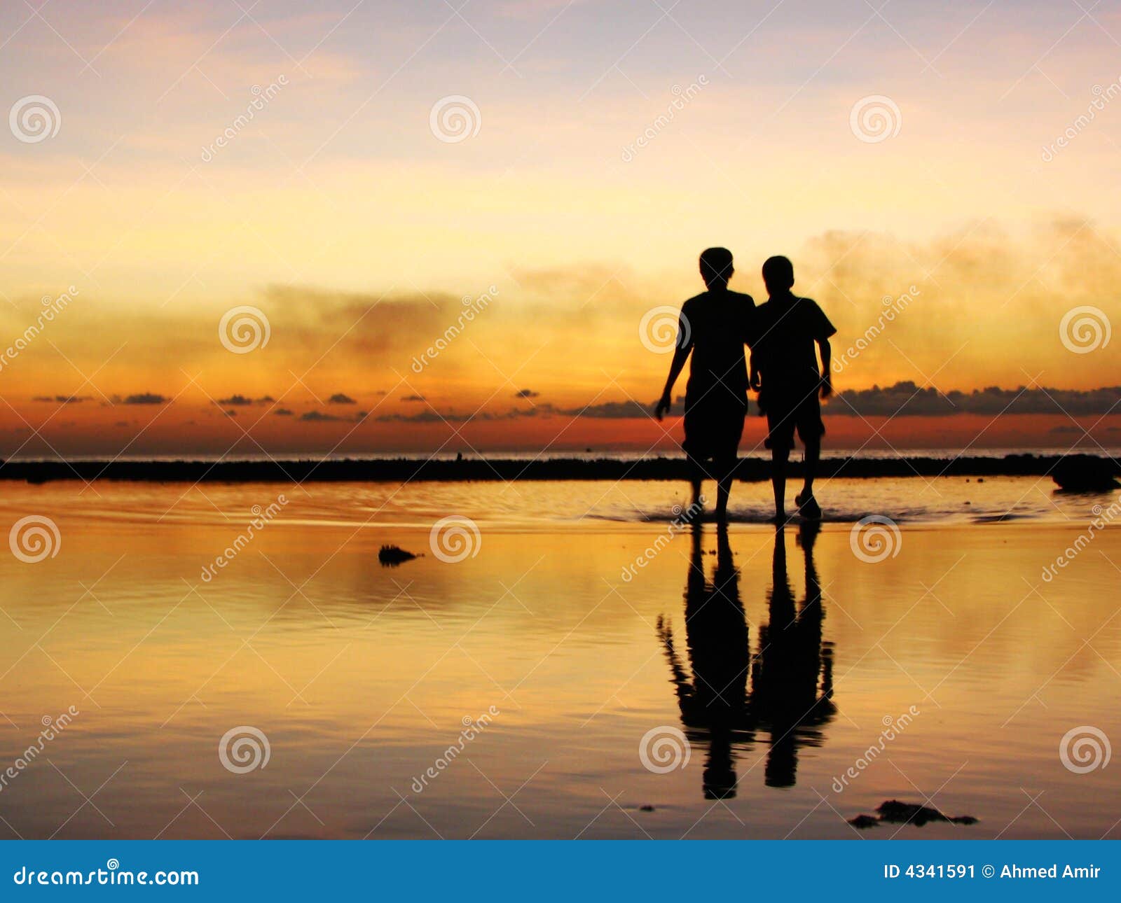 Time to go home kids stock image. Image of silhoutte, splash - 4341591