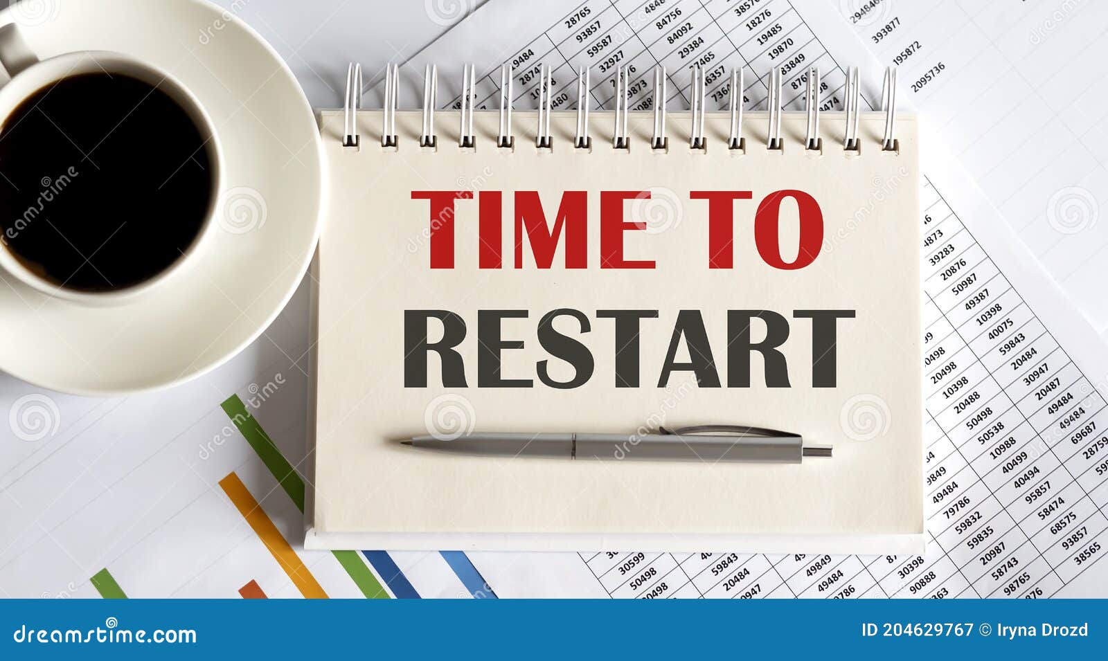 Time To Restart Text Written on a Notebook with Pen and Chart Stock ...