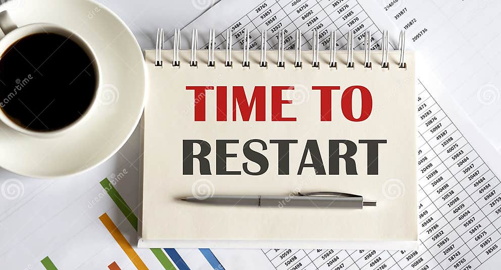 Time To Restart Text Written on a Notebook with Pen and Chart Stock ...