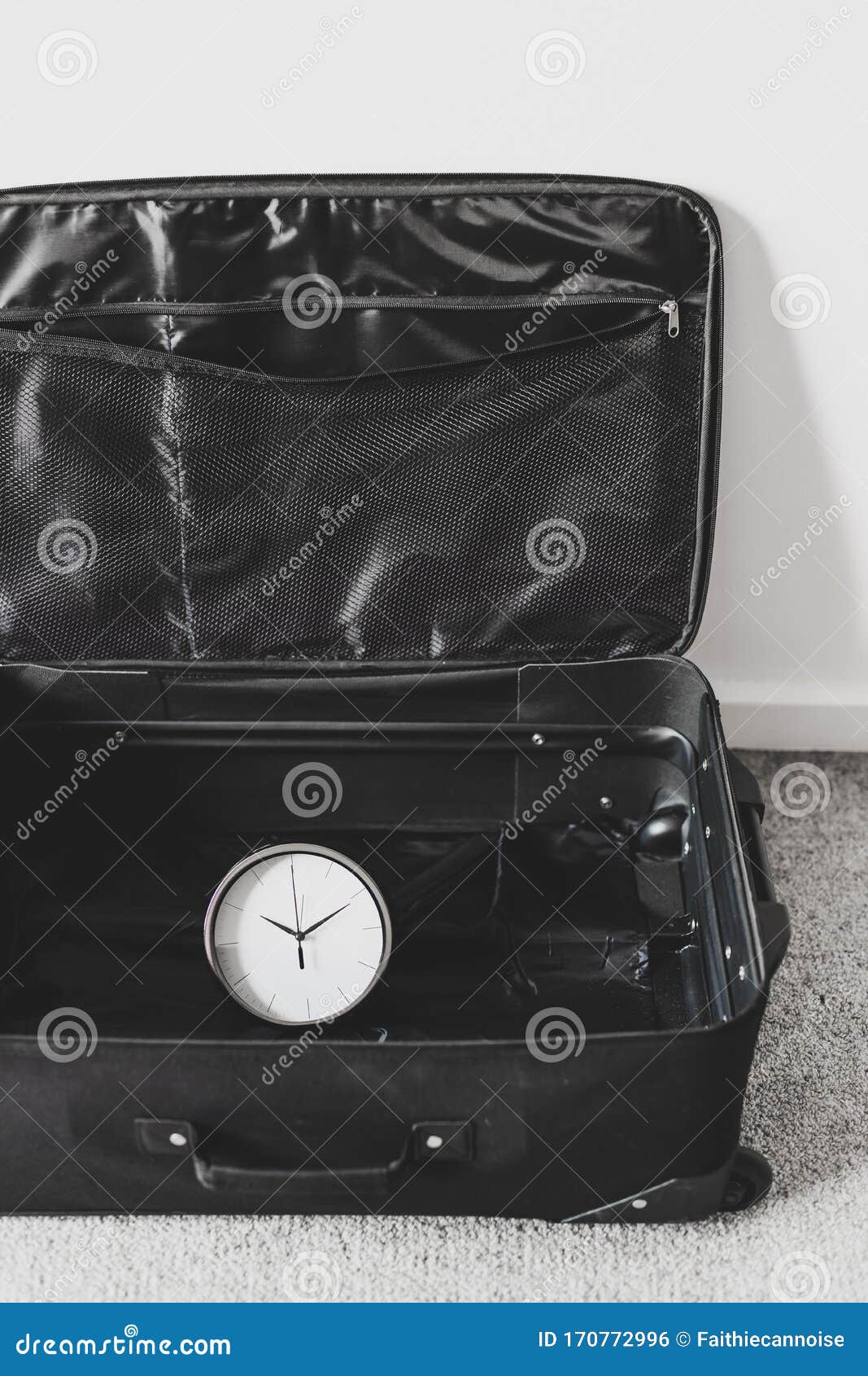 Time To Travel or Delay during a Trip, Empty Suitcase with Clock in it ...