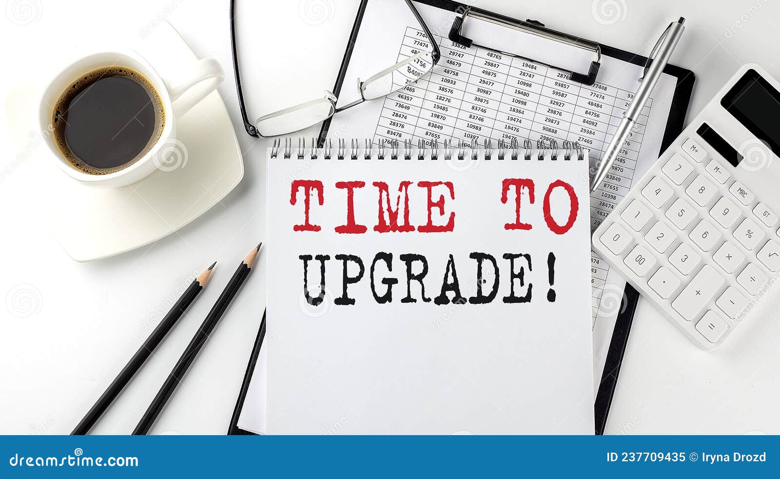 TIME TO UPGRADE Text on the Paper with Calculator, Notepad, Coffee ,pen ...