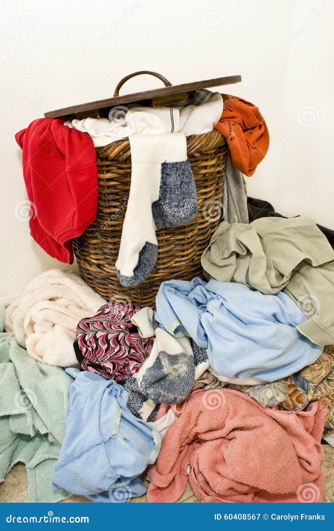 Overflowing laundry basket stock image. Image of colorful - 60408567