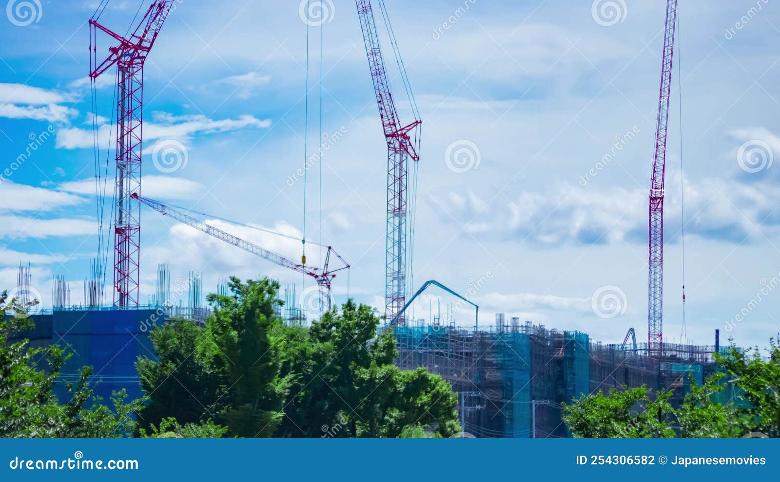 A Timelapse of Moving Cranes at the Under Construction Daytime Tilt ...