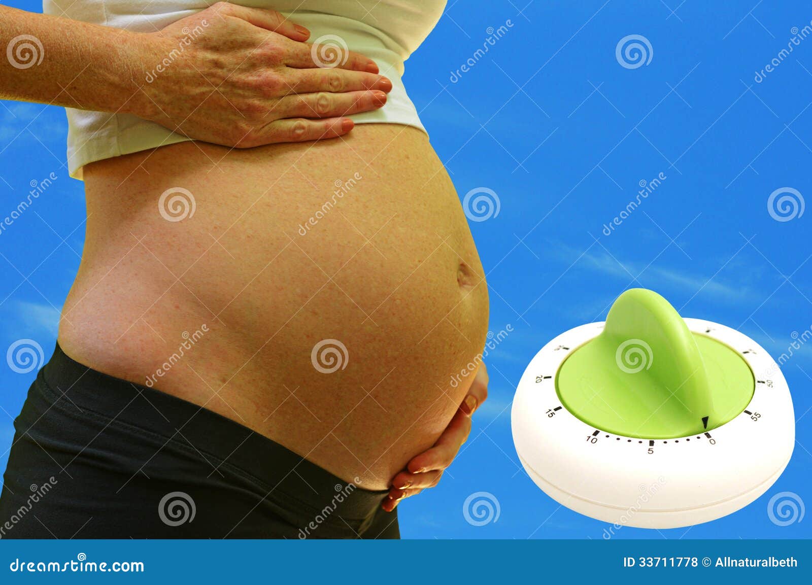 Timing contractions stock photo. Image of stomach, prenatal - 33711778