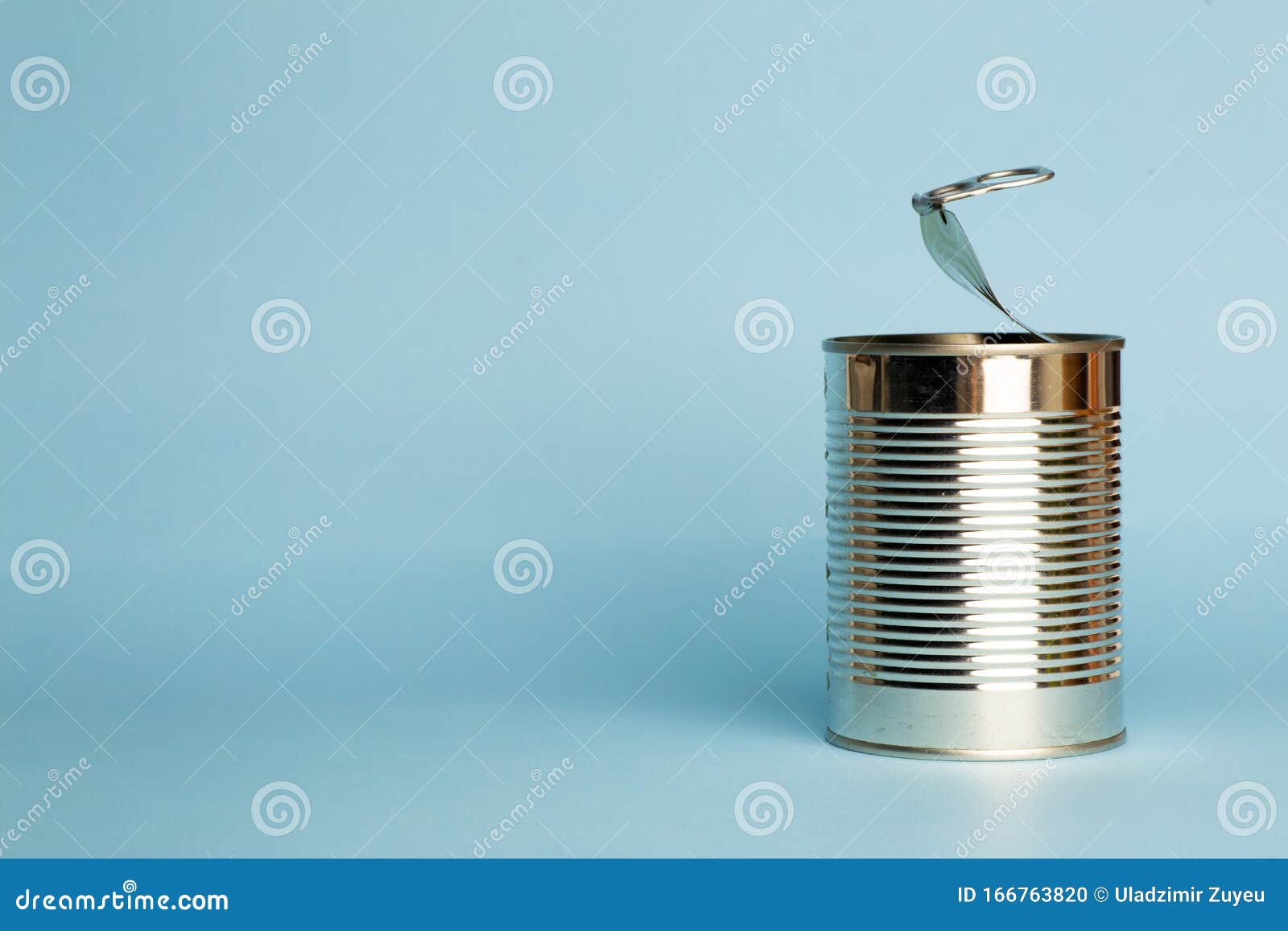 Tin Can on a Blue Background. Recycling of Metal and Environmental ...