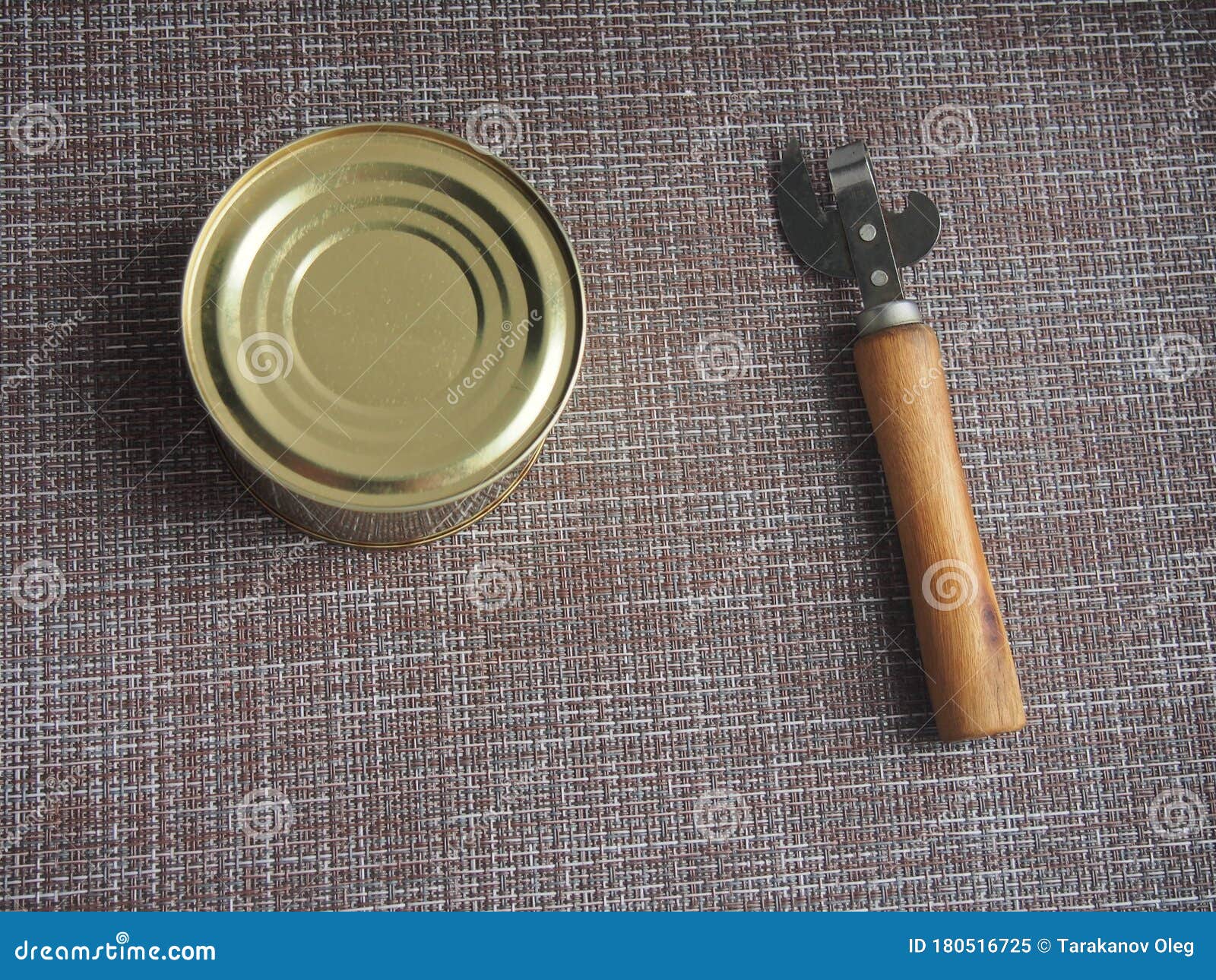 A Tin Can and a Can Opener. the Opening of the Cans Stock Image - Image ... A Tin Can and a Can Opener. the Opening of the Cans Stock Image - Image ...