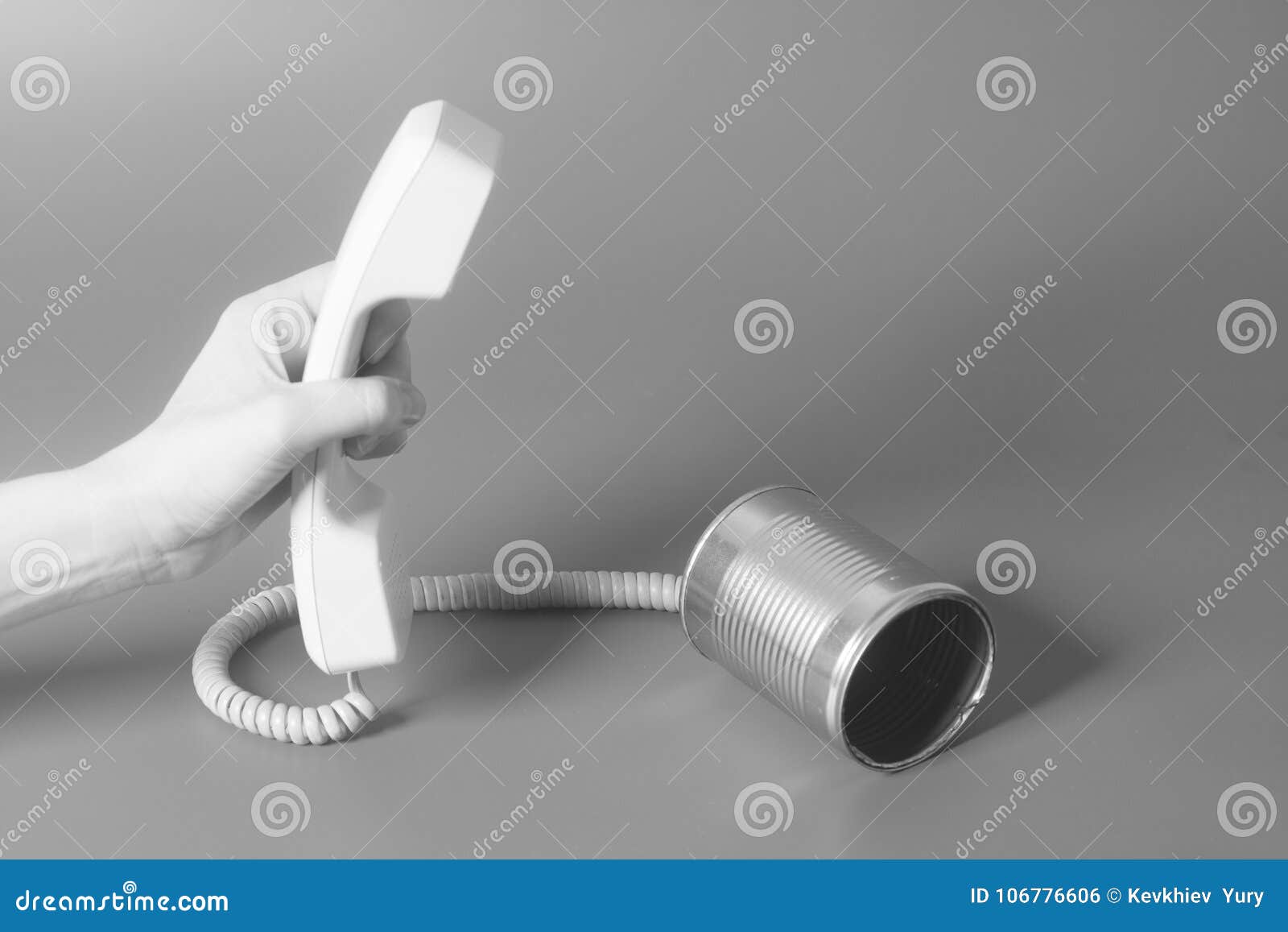 Tin Can Phone Handset Holding Hand Stock Photo - Image of call, gray ...