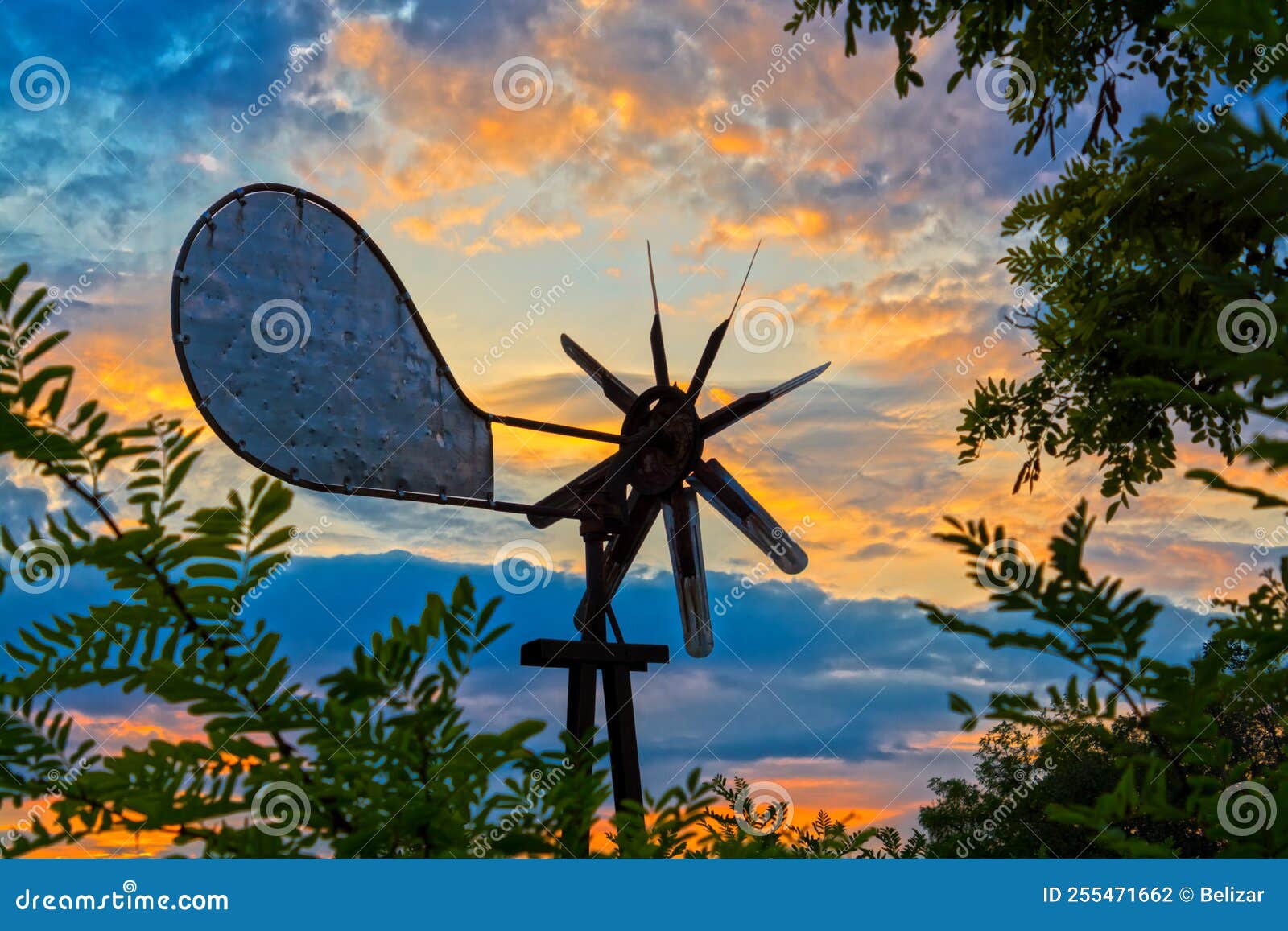 Tin Pinwheel at Late Afternoon in Windy Weather Stock Photo - Image of ...