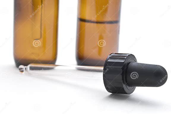 Tincture Bottles and Pipette Stock Photo - Image of apothecary, amber ...