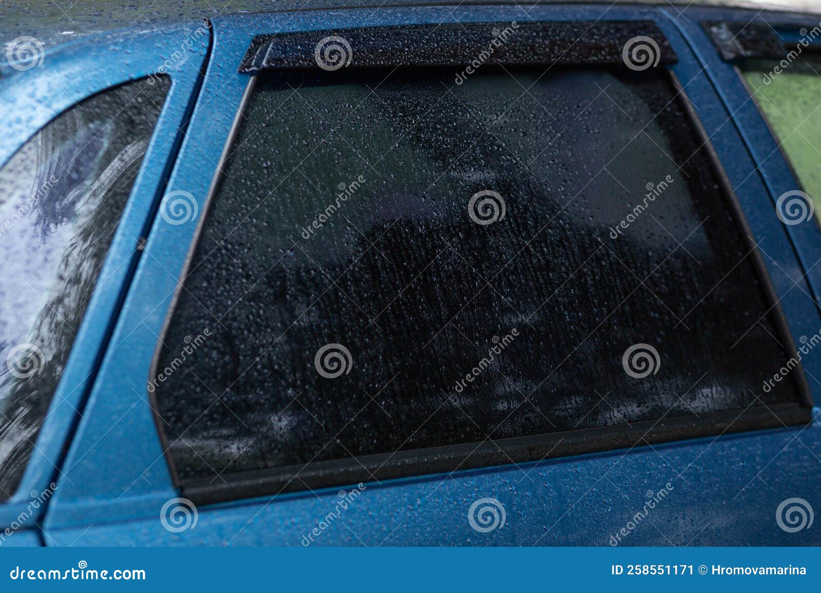 Tinted Rear Window of a Car with Raindrops Stock Image - Image of view ...