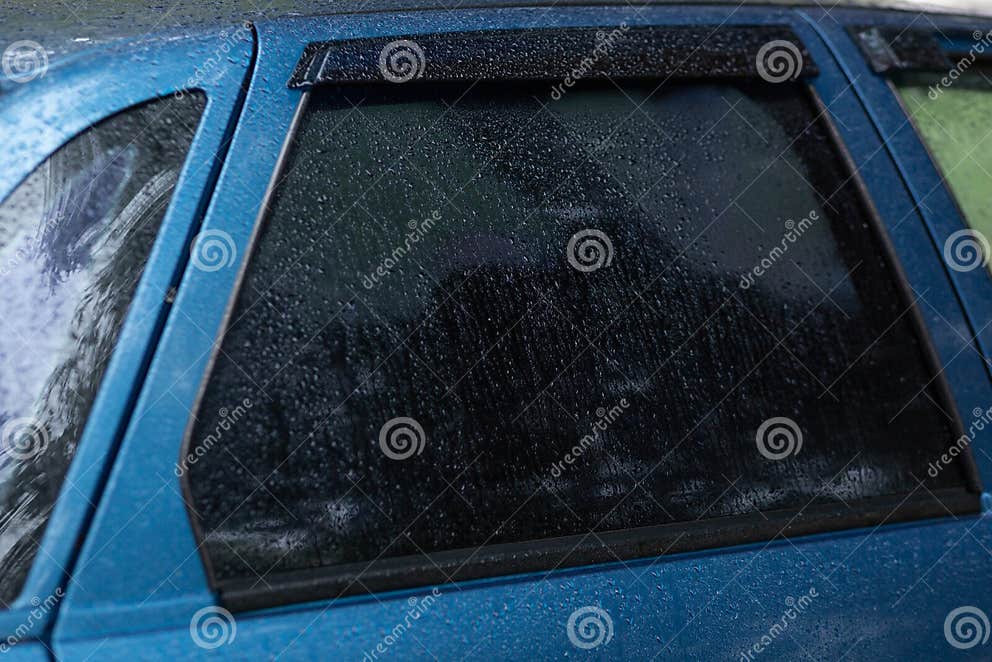 Tinted Rear Window of a Car with Raindrops Stock Image - Image of view ...