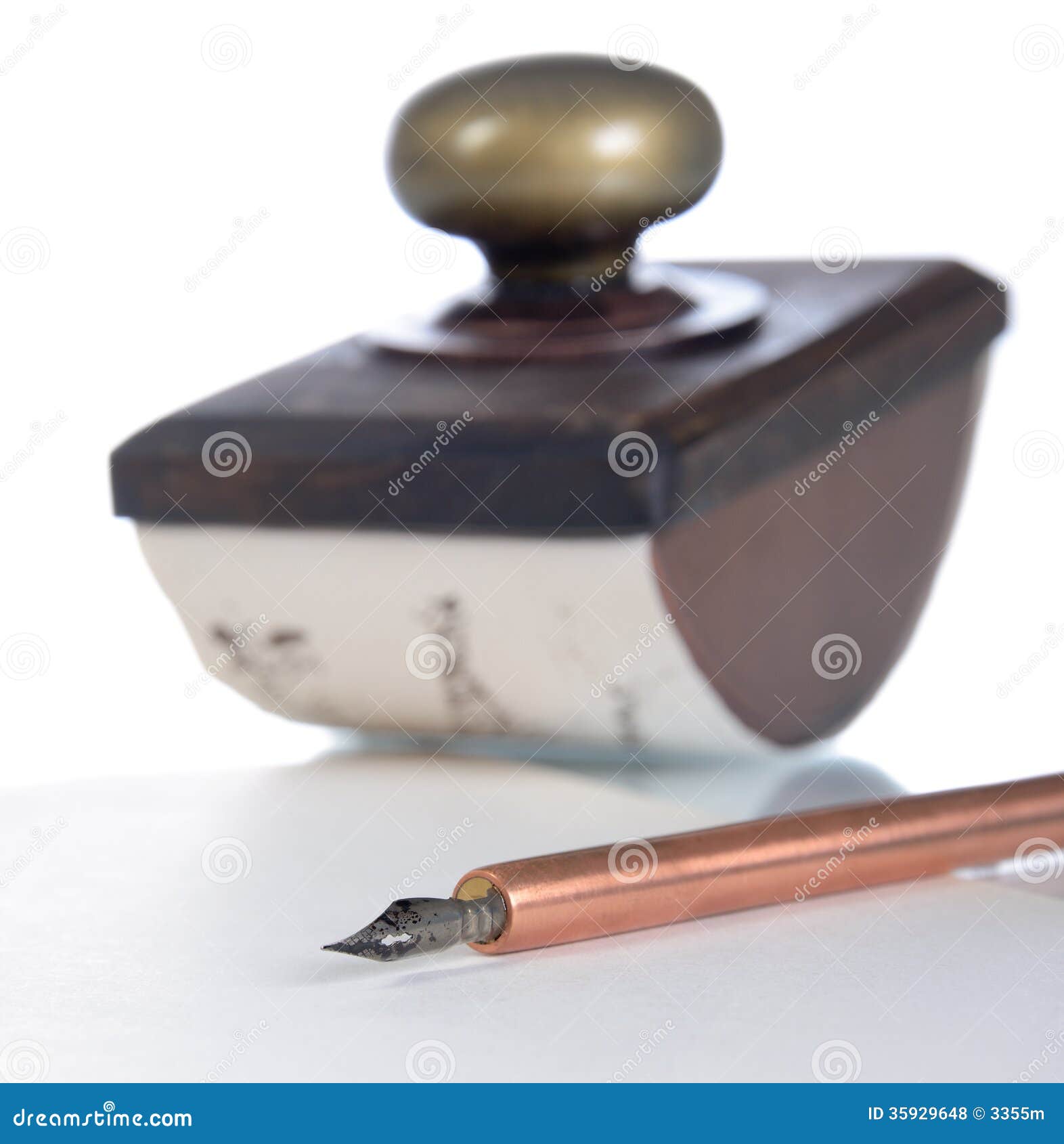 Tintenstift Und -papierbeschwerer Stockfoto - Bild von tinte ...
