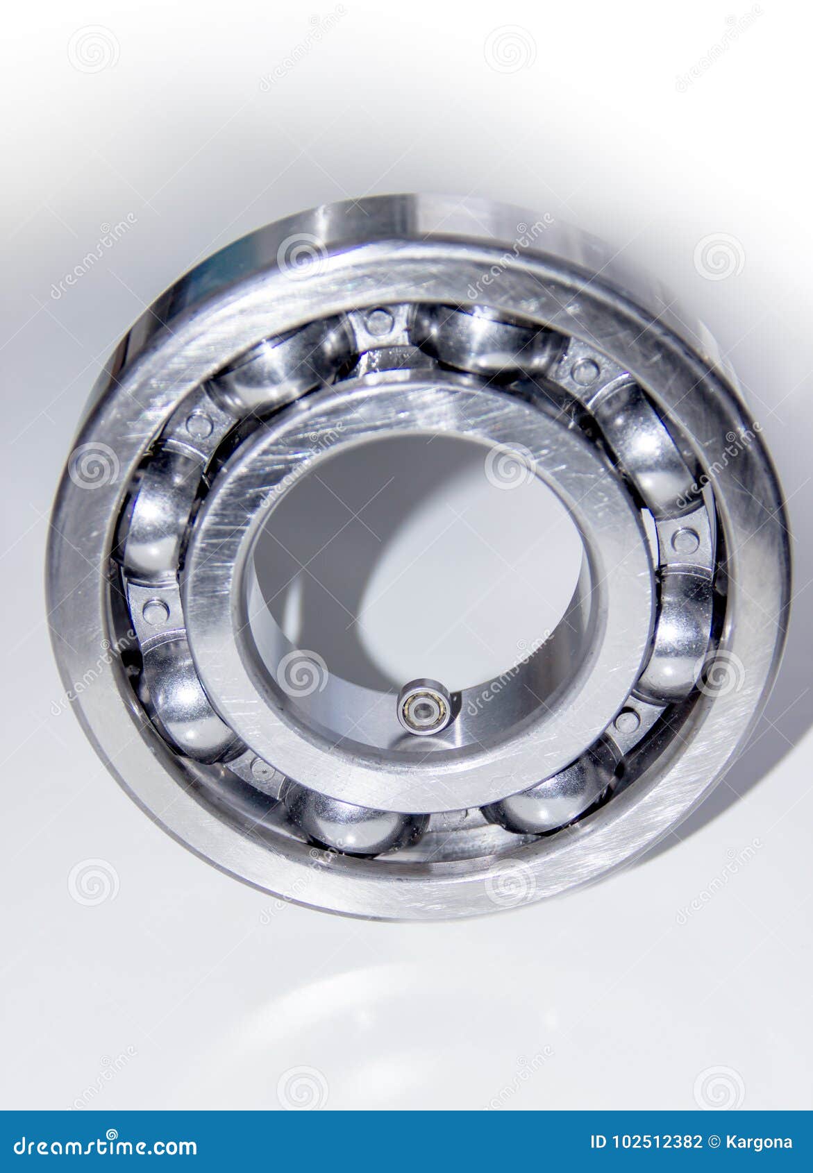 A Tiny Bearing Inside a Big Bearing Stock Photo - Image of comparison ...