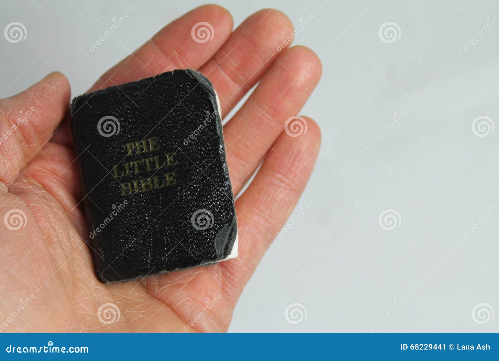 Tiny Bible in Hand stock image. Image of worn, peace - 68229441