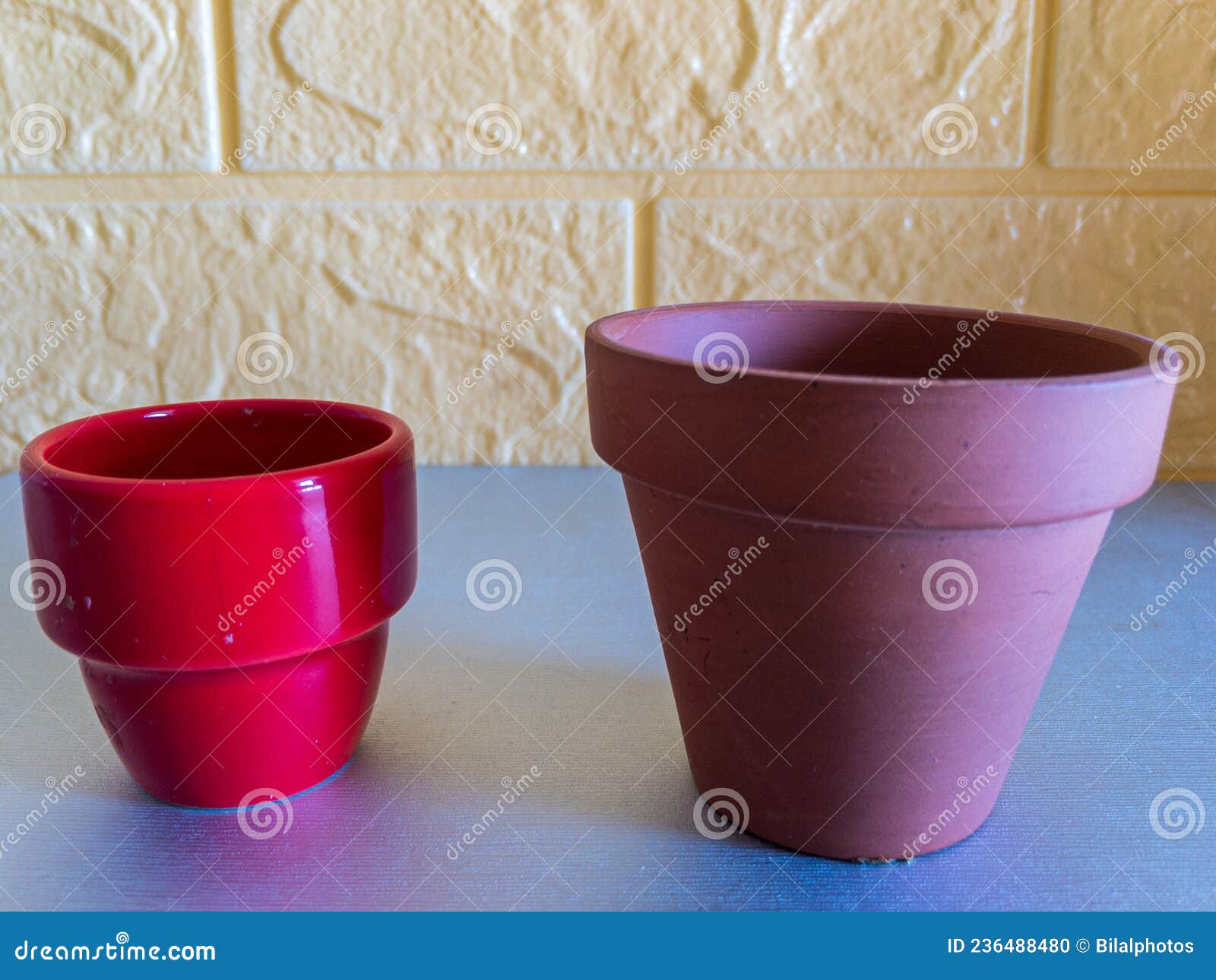 Tiny Ceramic Red Pot with Miniature Terracotta Pot Stock Photo - Image ...