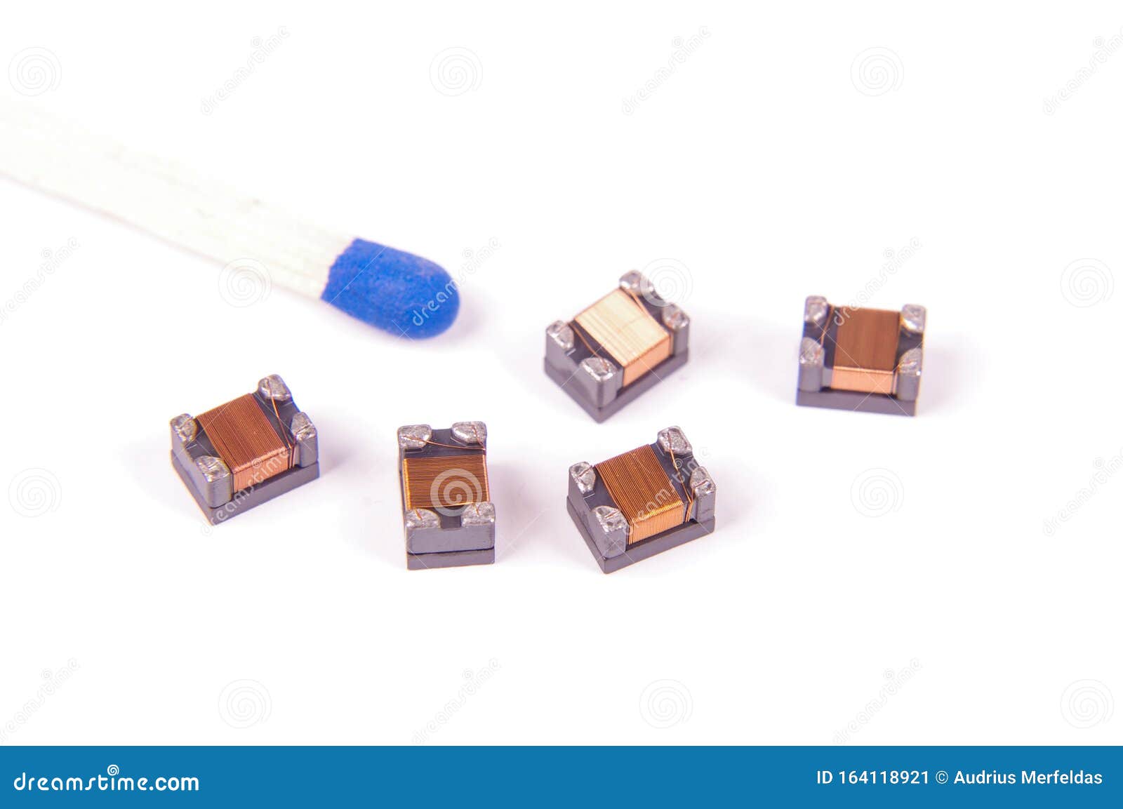 Tiny Common Mode Choke Filter in Comparison with Match Head Stock Image ...