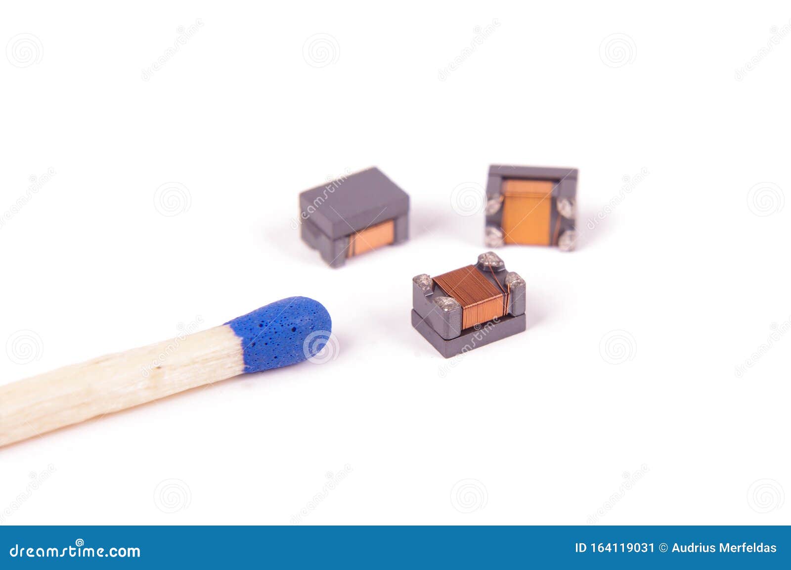 Tiny Common Mode Choke Filter in Comparison with Match Head Stock Image ...