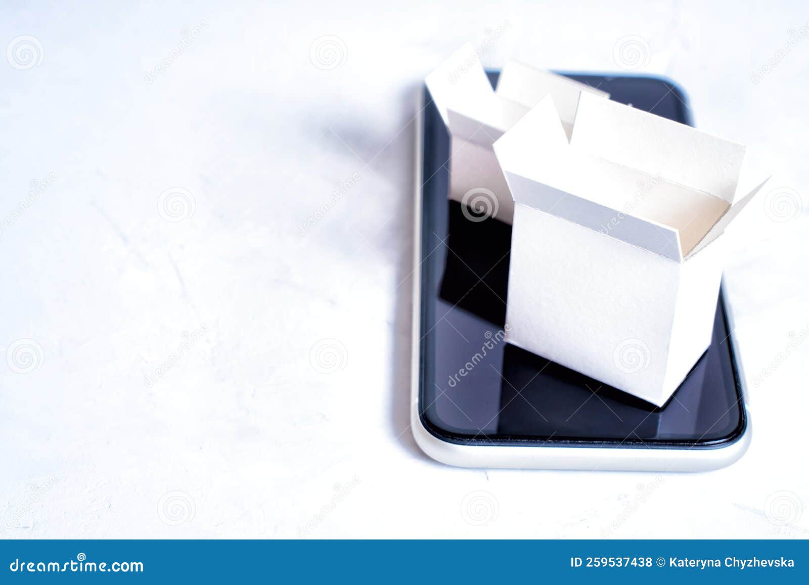 Tiny Delivery Boxes Placed on a Smartphone Stock Photo - Image of white ...