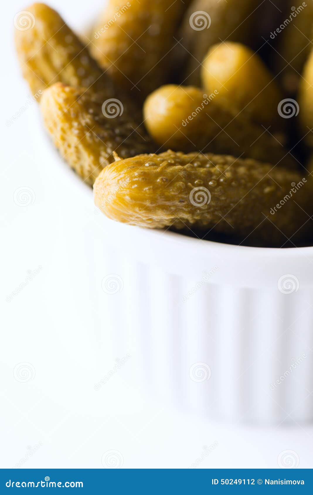 Tiny Dill Pickles in Bowl Macro Stock Photo - Image of food, background ...