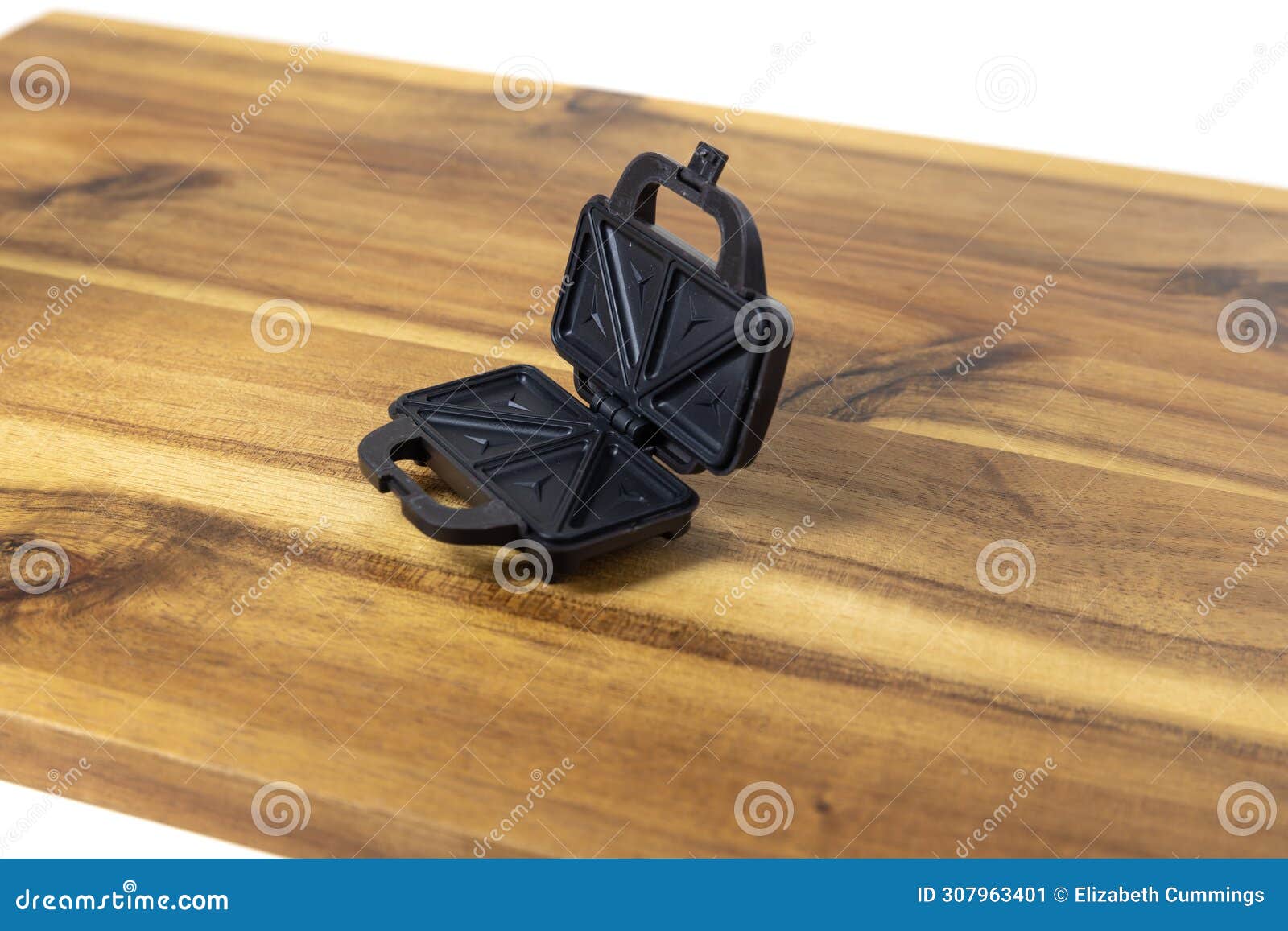 Tiny Doll Sized Sandwich Toaster on a Wood Cutting Board Side View ...