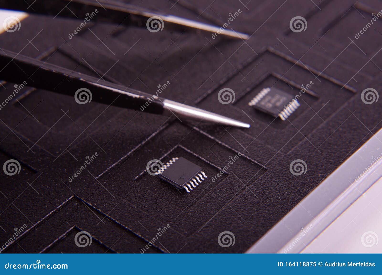 Tiny Electronics Chip Component on the Black Antistatic Mat Stock Image ...