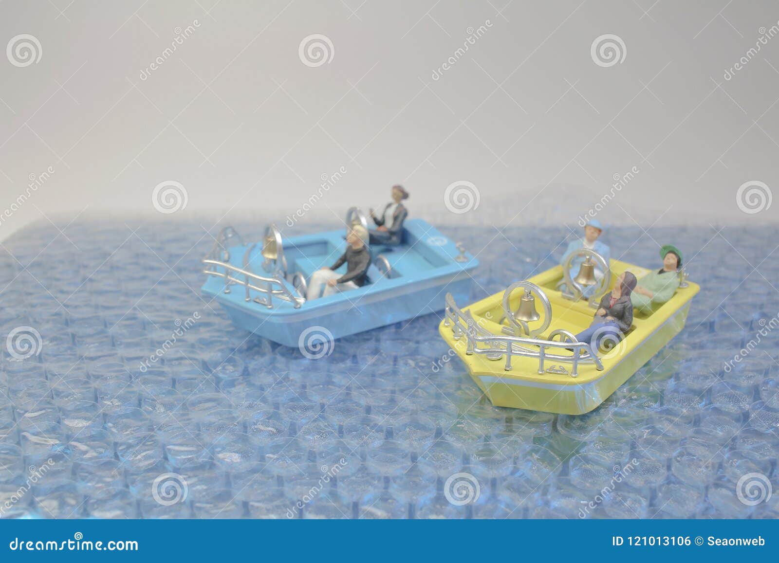 A Tiny Figure with a Small Boat Stock Photo - Image of proportion ...