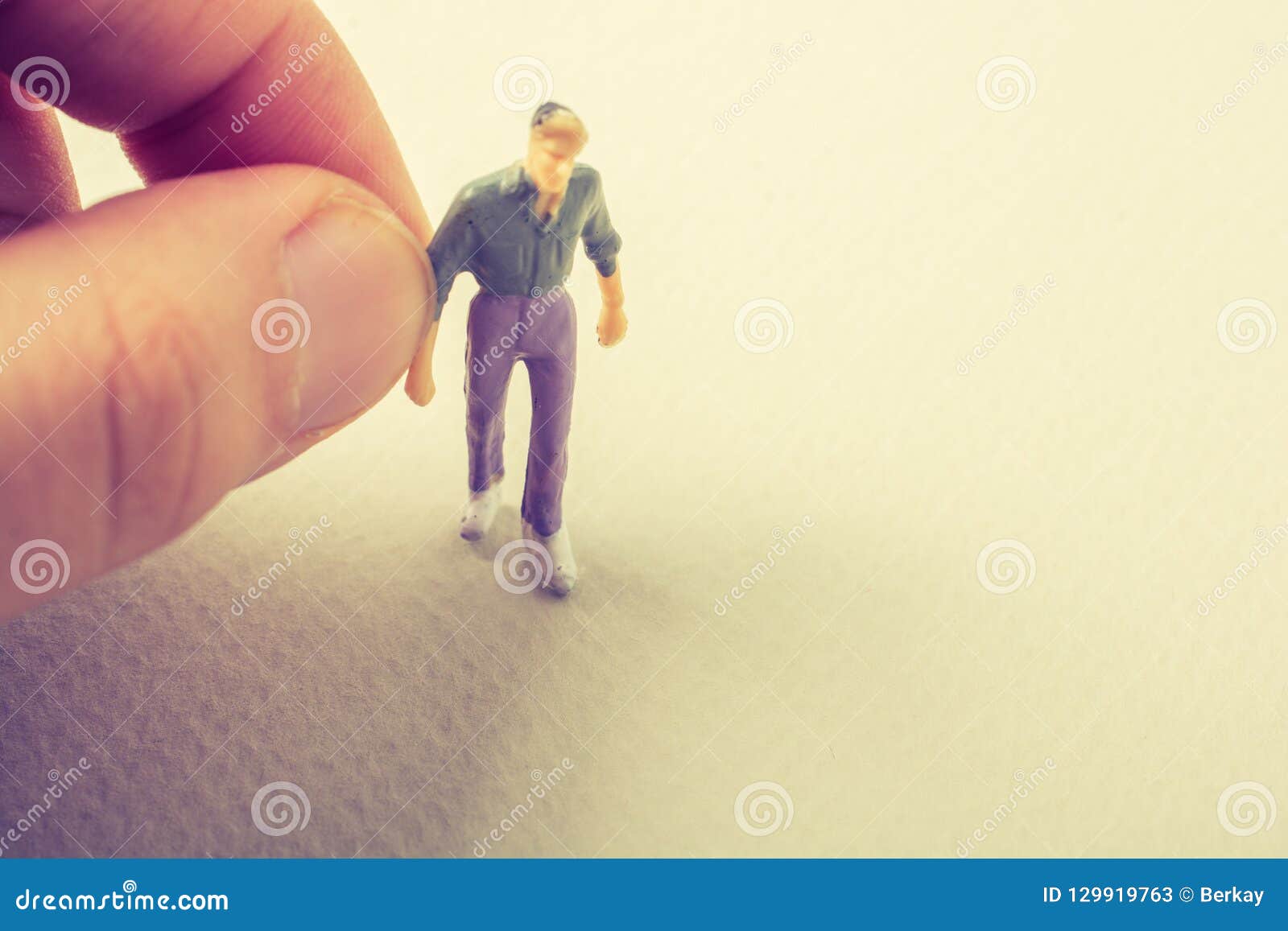 Tiny Figurine of Man Model in View Stock Image - Image of hand, doll ...