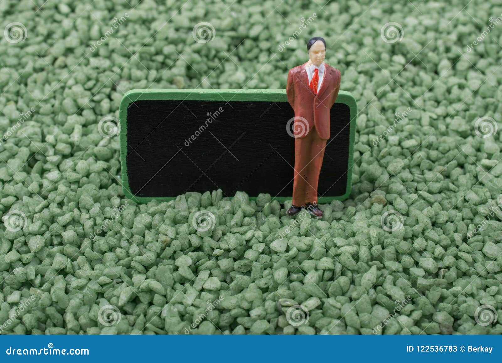 Tiny Figurine of Man Model and Notice Board Stock Image - Image of ...