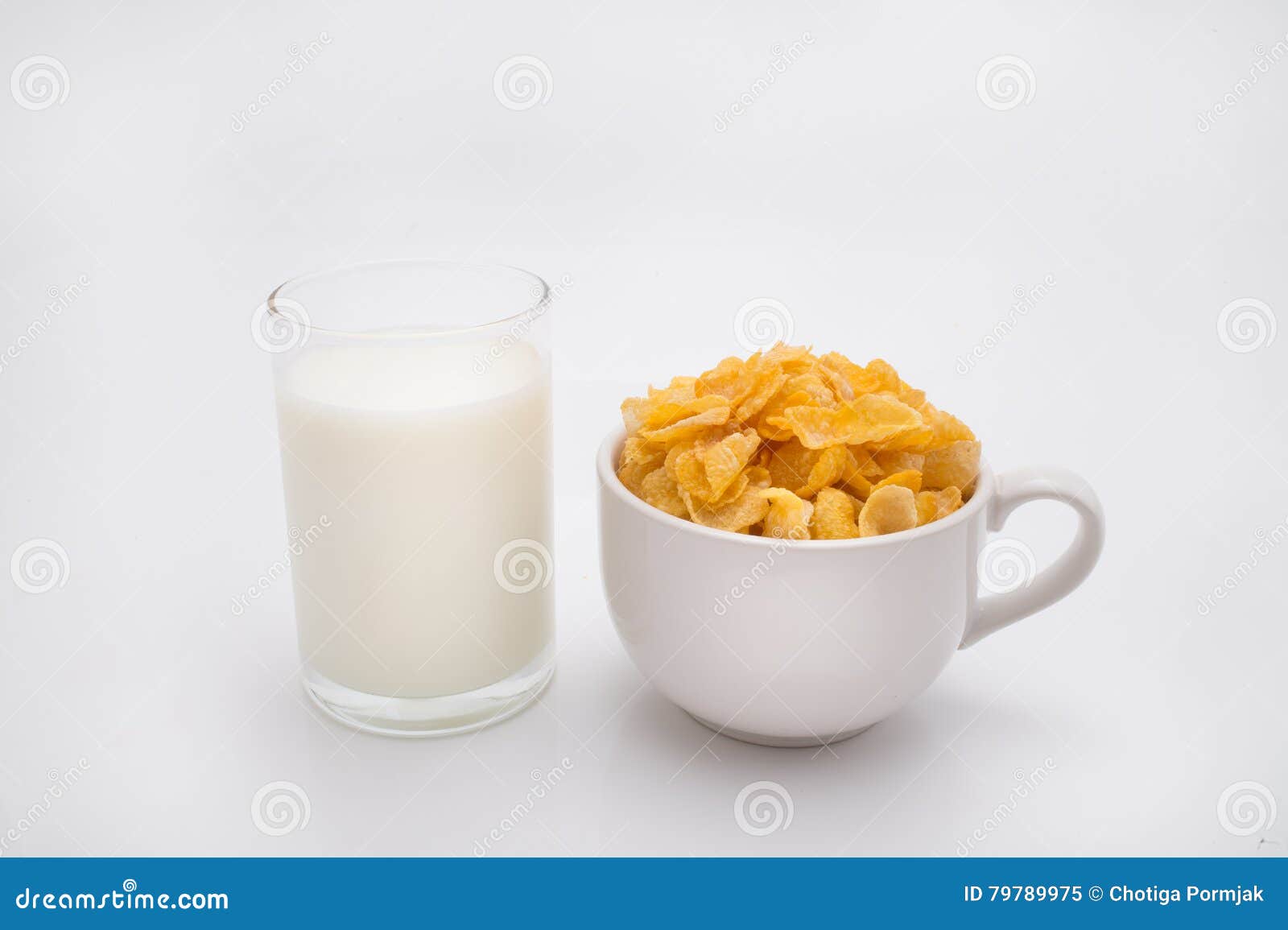 A Tiny Glass of Milk with a Tiny Cup of Corn Flakes Stock Image - Image ...