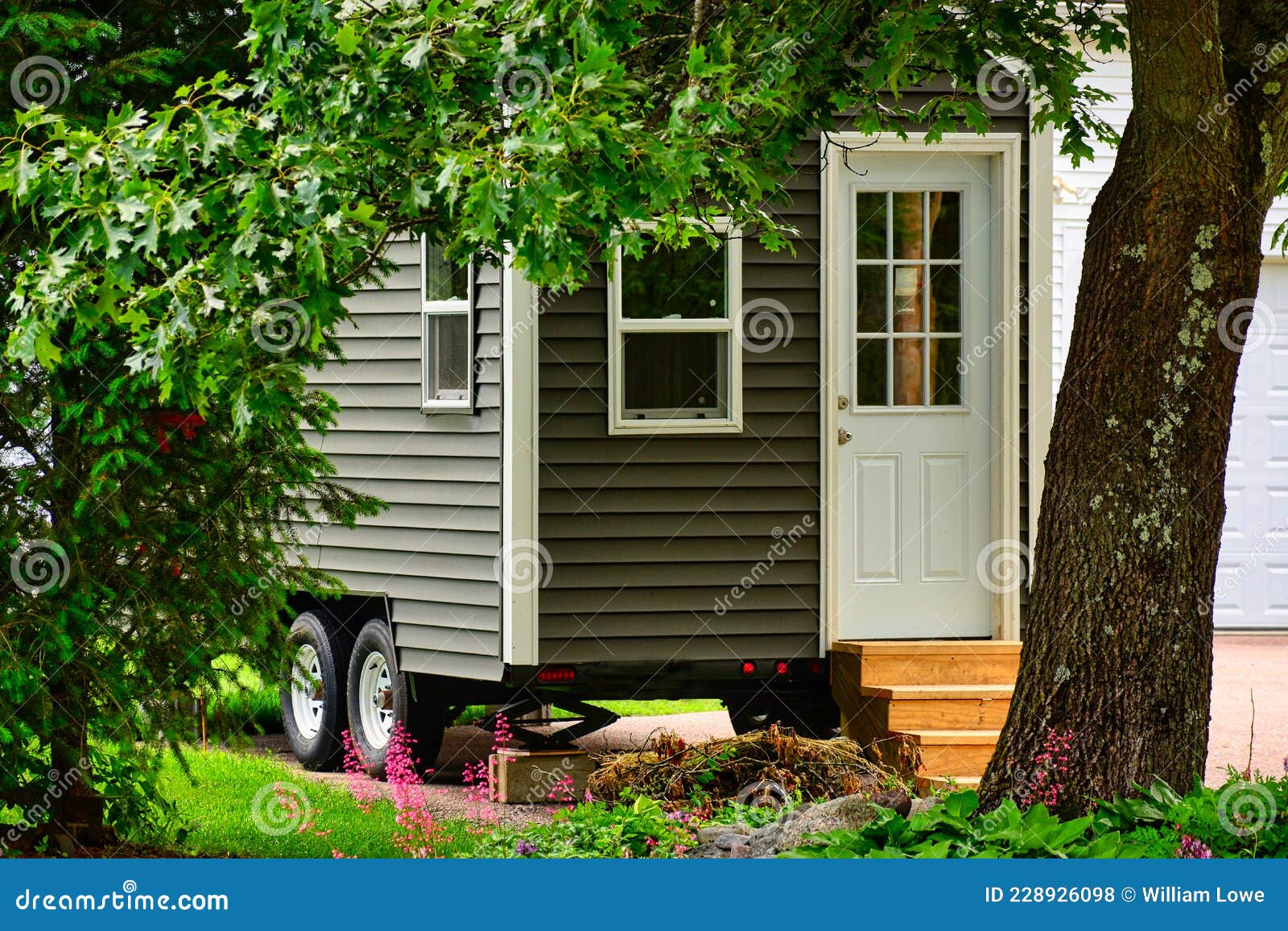 Tiny Gray Mobile Home for Glamping Stock Photo - Image of home, simple ...