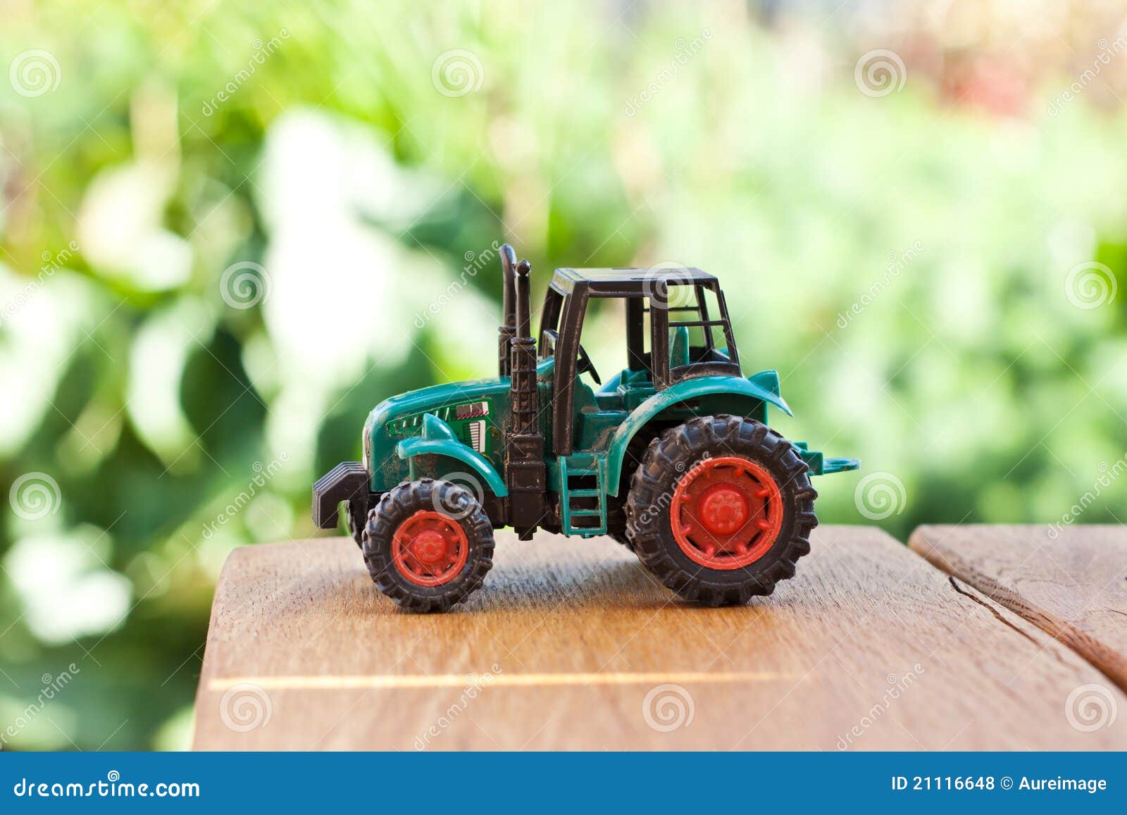 Tiny green tractor stock photo. Image of vehicle, tractor - 21116648