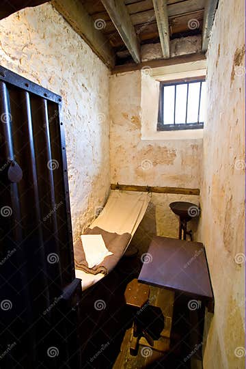 Tiny old prison cell stock photo. Image of table, walls - 11676690