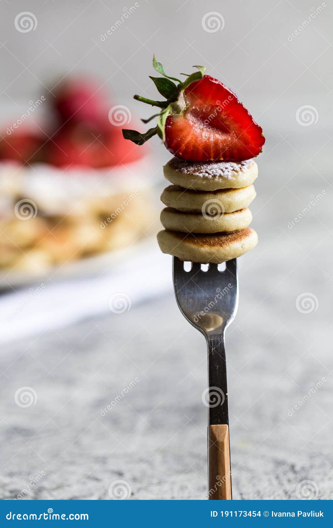 Tiny Pancakes for Breakfast. Mini Pancakes on a Fork with Strawberries ...
