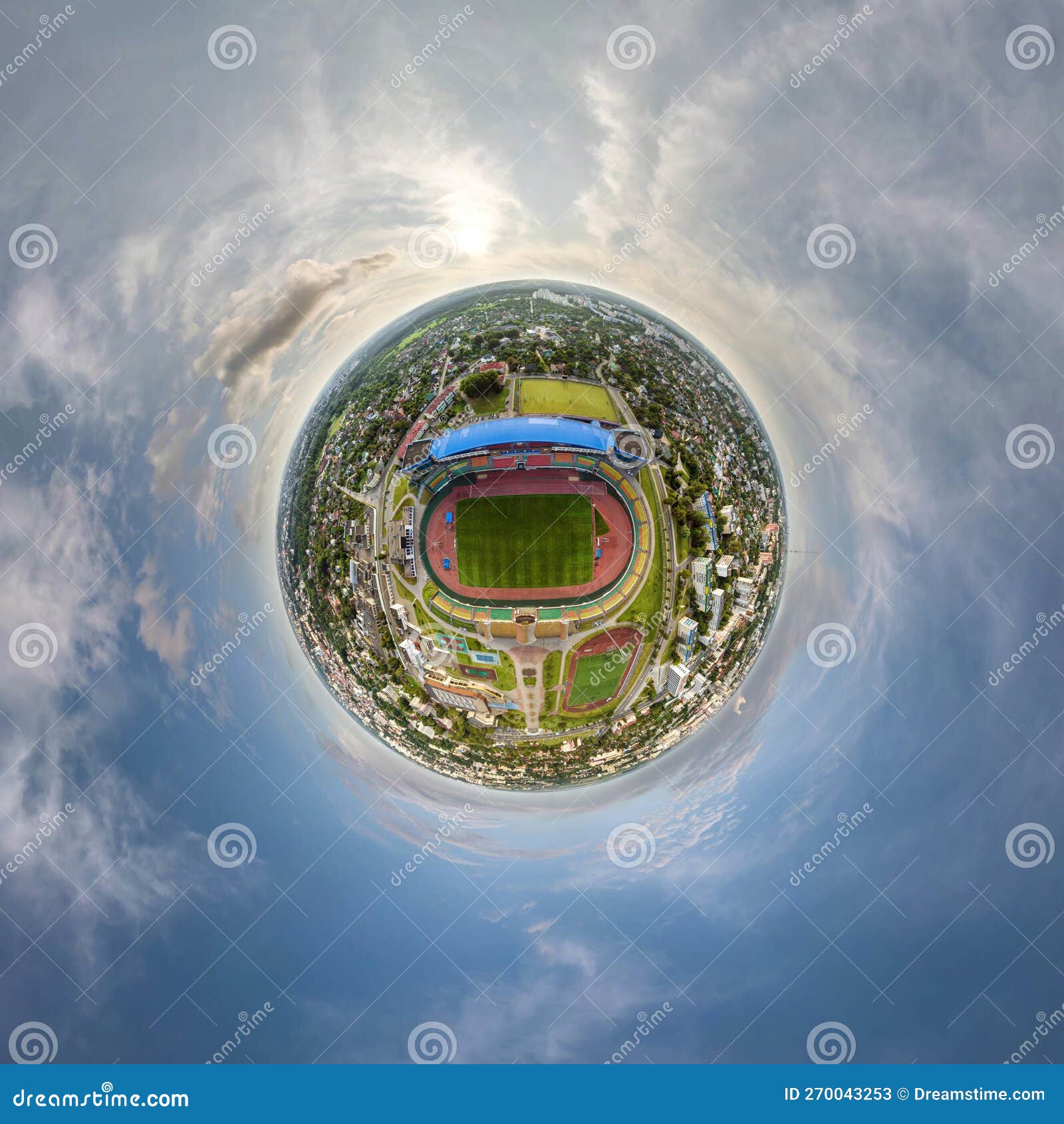 Tiny Planet in Sky with Clouds Overlooking Above on Empty Stadium or ...