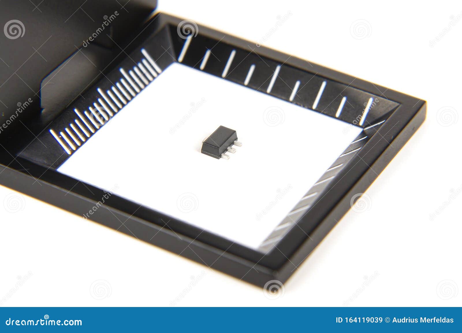 Tiny SMT Electronics Chip Component Close To Metal Ruler Stock Image ...