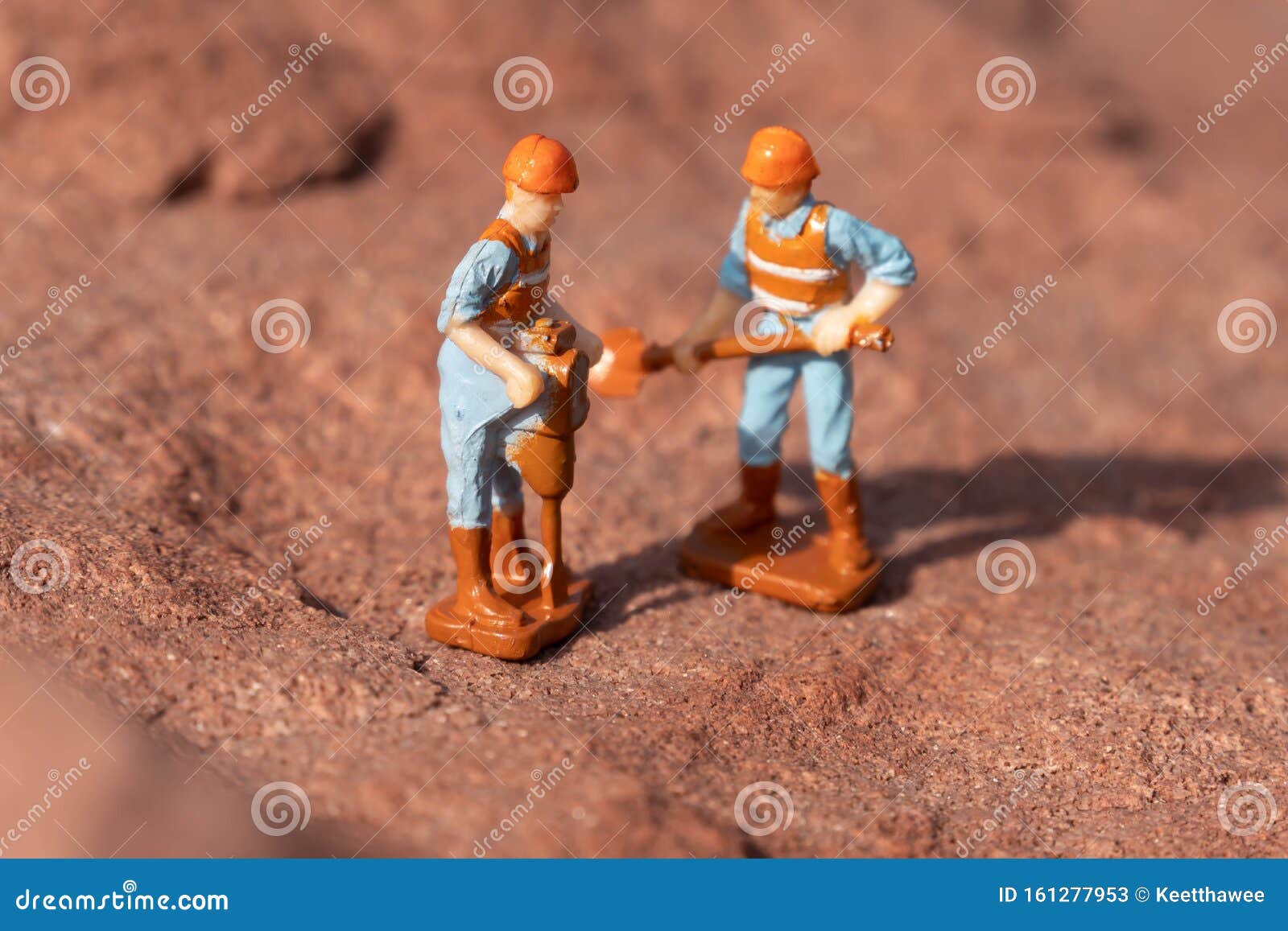 2 tiny toy Constructon man stock image. Image of construction - 161277953