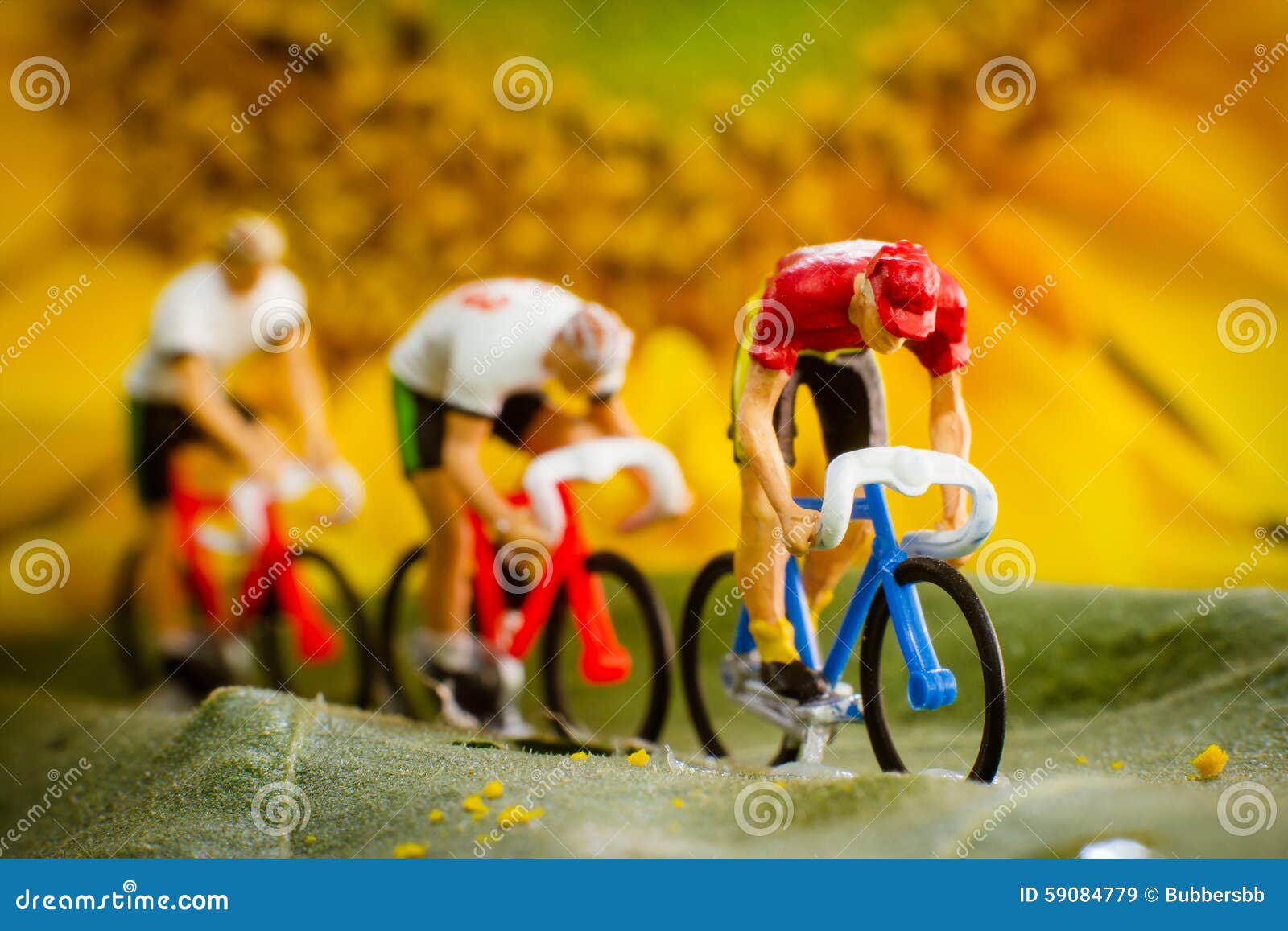 Tiny toy cyclists stock image. Image of biking, team - 59084779