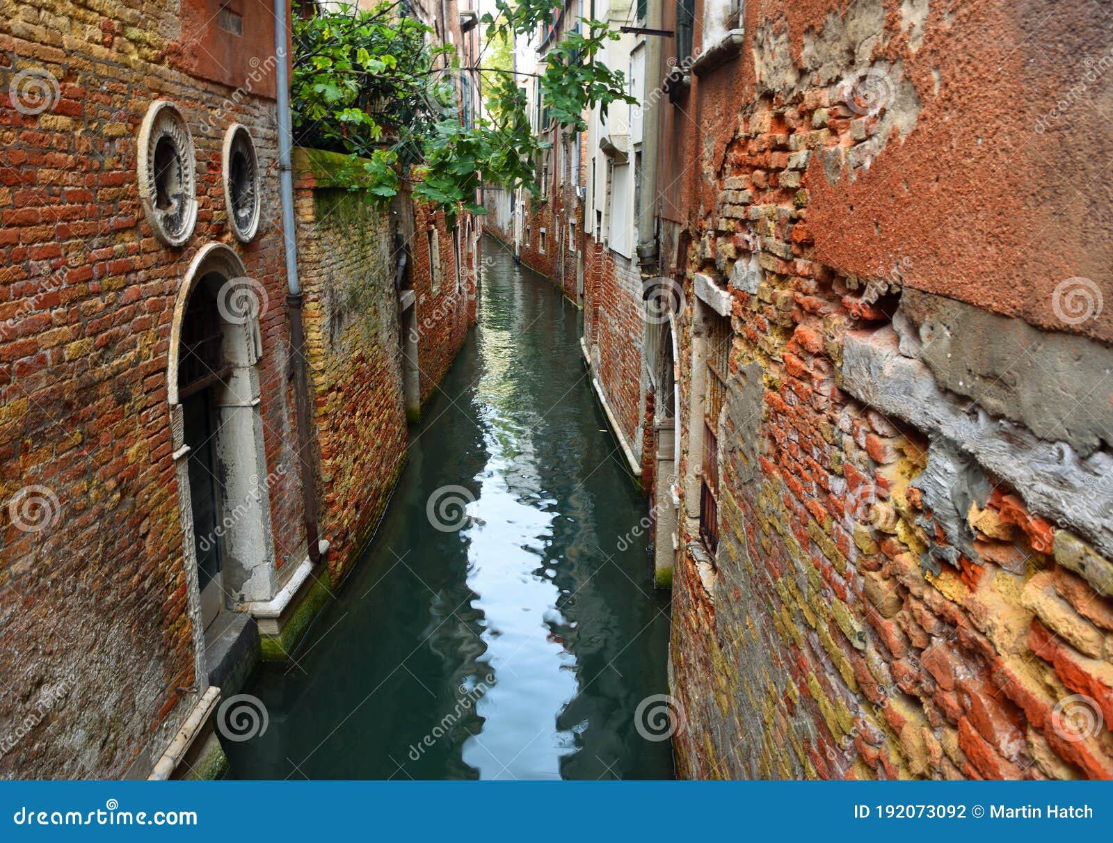 Tiny Venice Canal - Rio with Crumbling Walls Doors and Water Stock ...