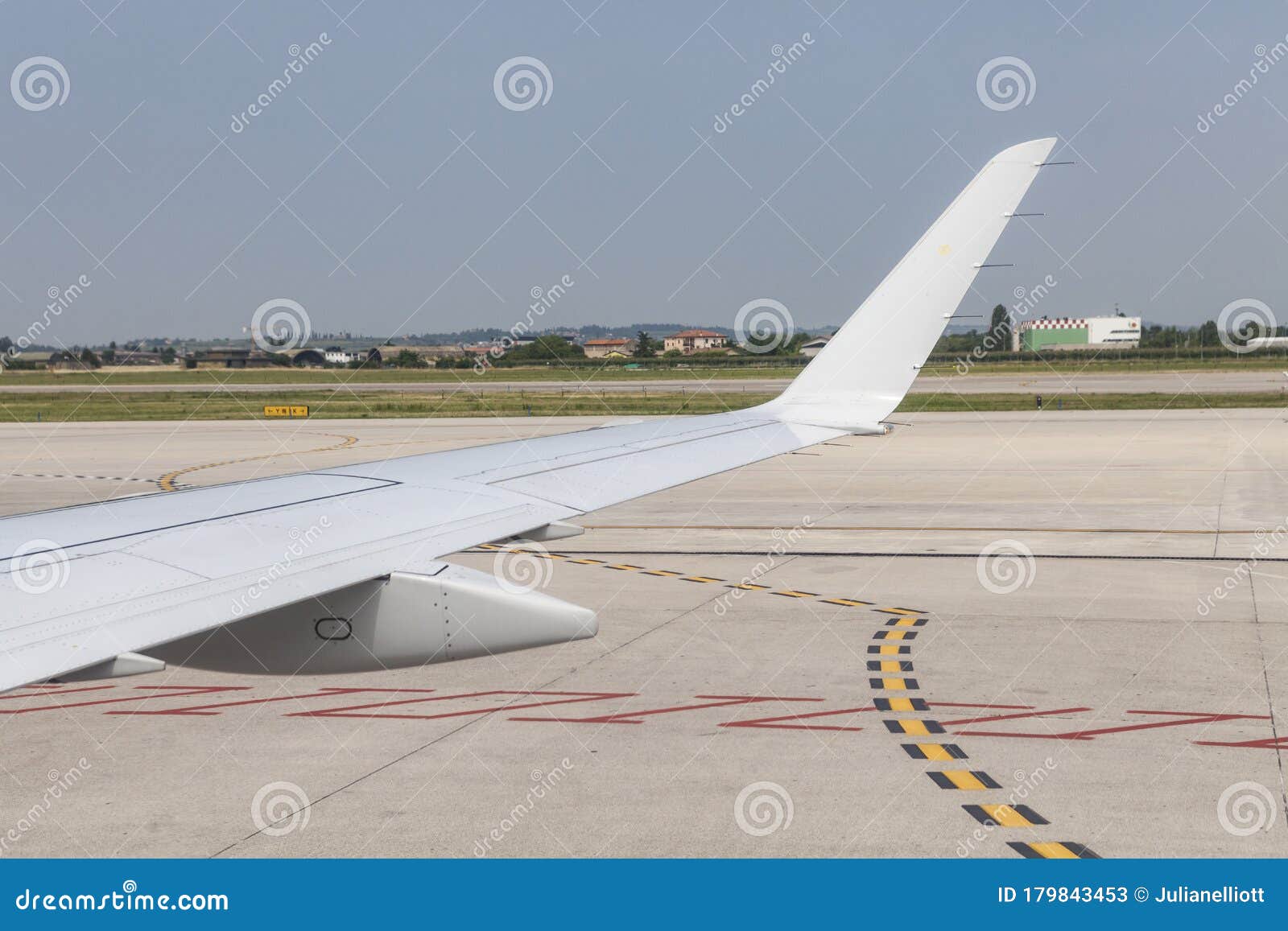 Tip of an Aircraft Wing on the Runway Stock Image - Image of airstrip ...