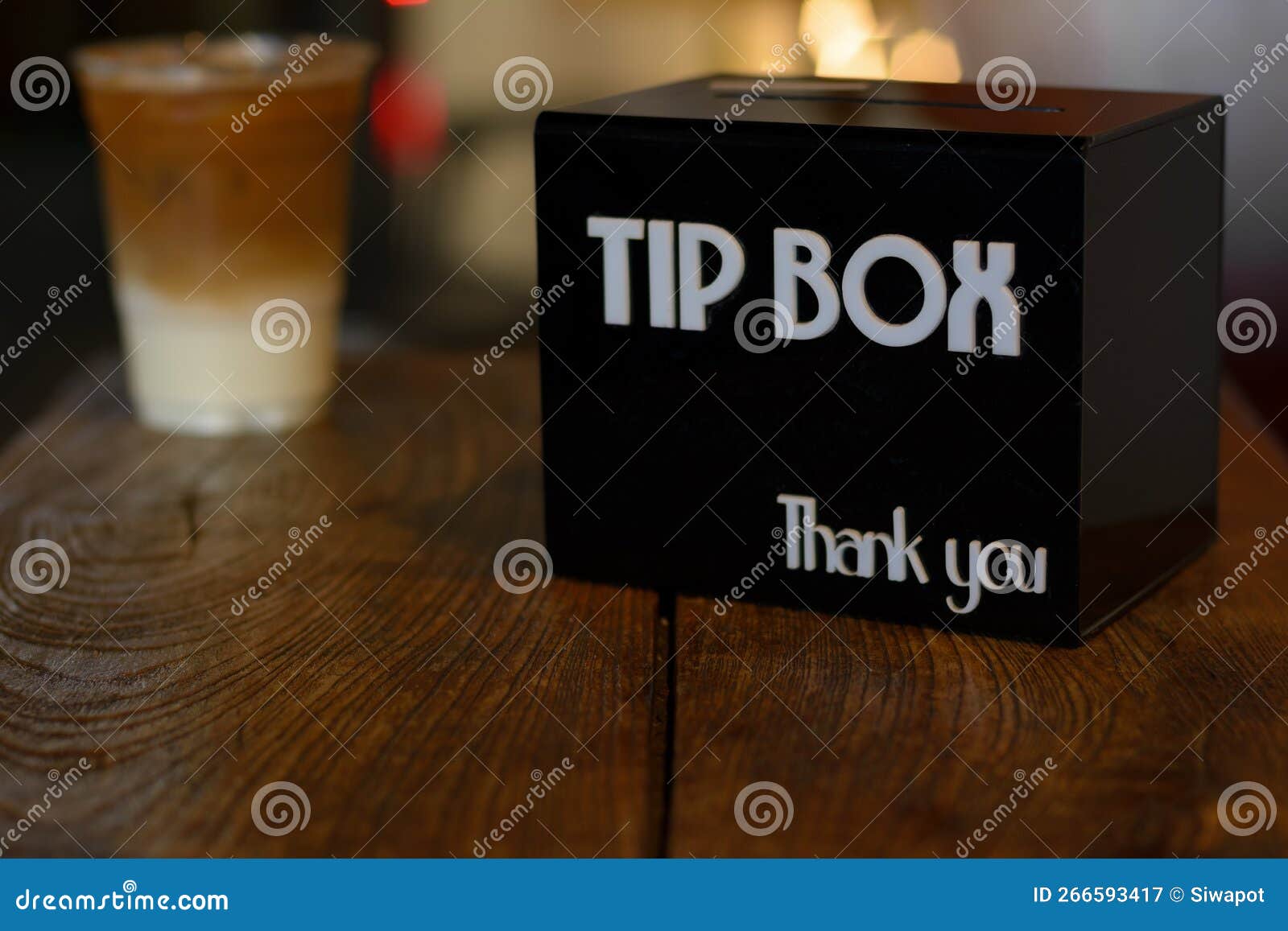 Tip Box in Coffee Shop with Low Light Blurred Stock Image - Image of ...