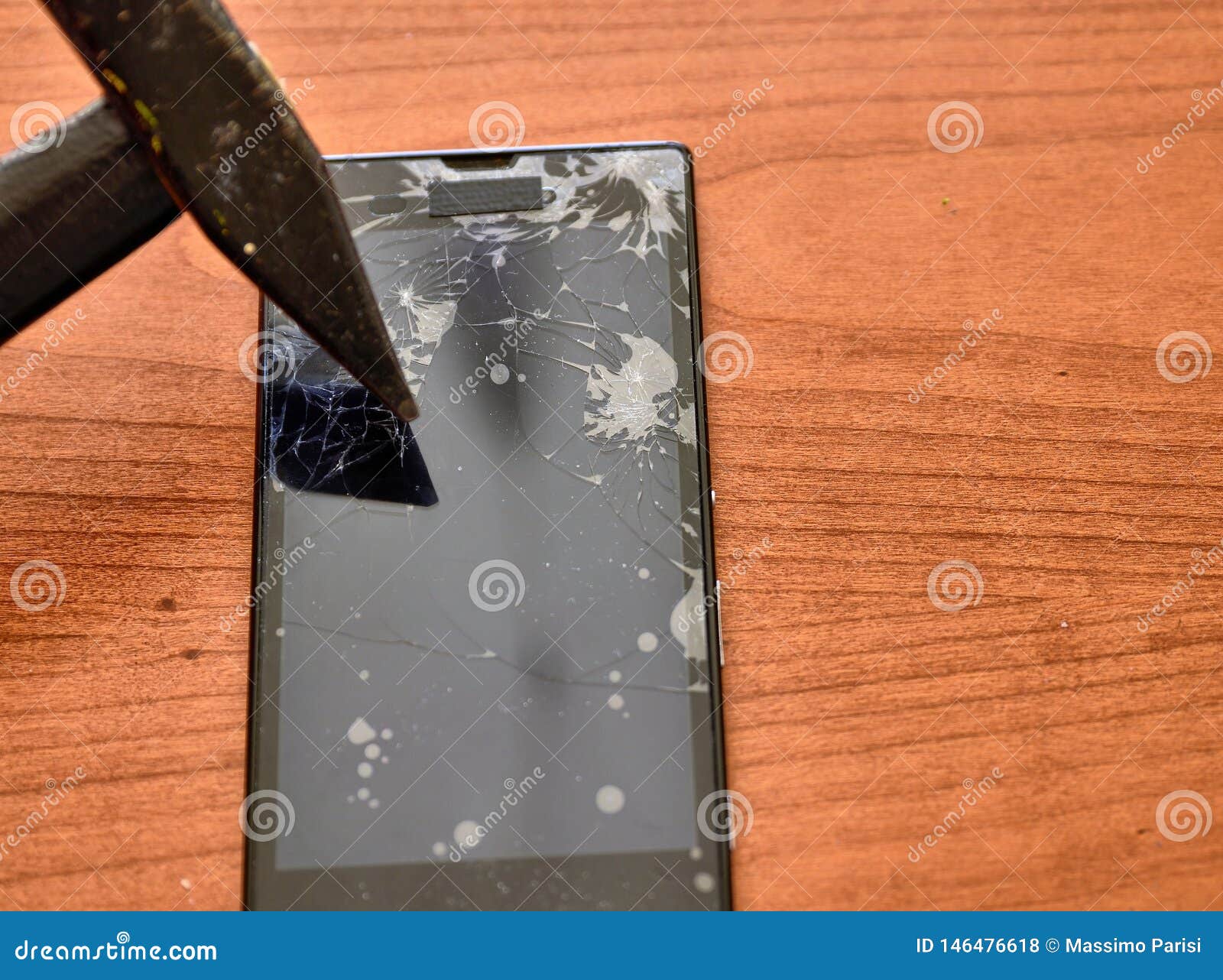 The Tip of the Hammer Hit the Screen of the Smartphone Stock Photo ...