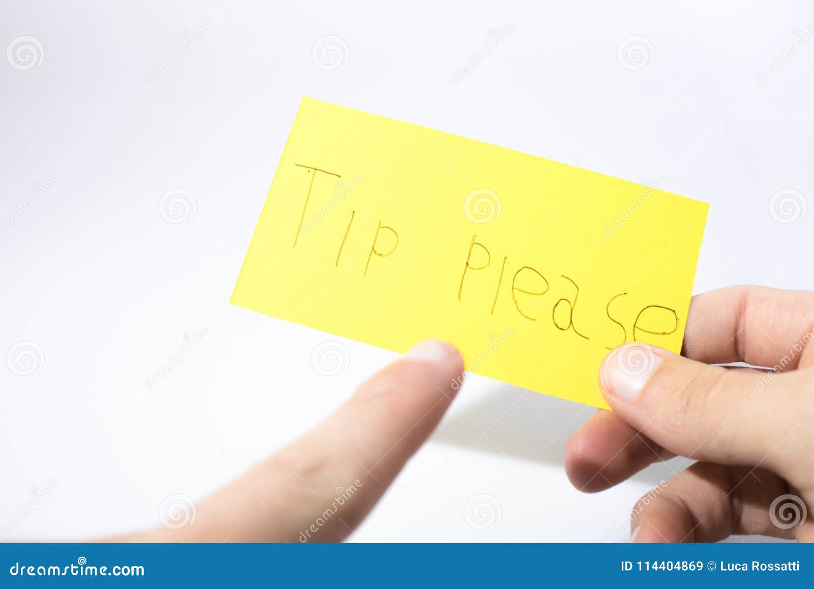 Tip Please Handwrite with a Hand on a Yellow Paper Stock Image - Image ...
