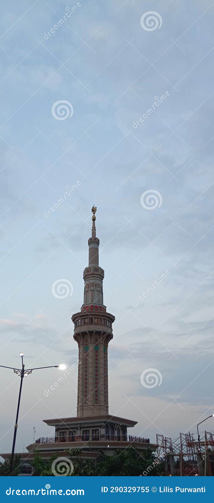 The Tip of the Tower Rises High in the Blue Sky Stock Image - Image of ...